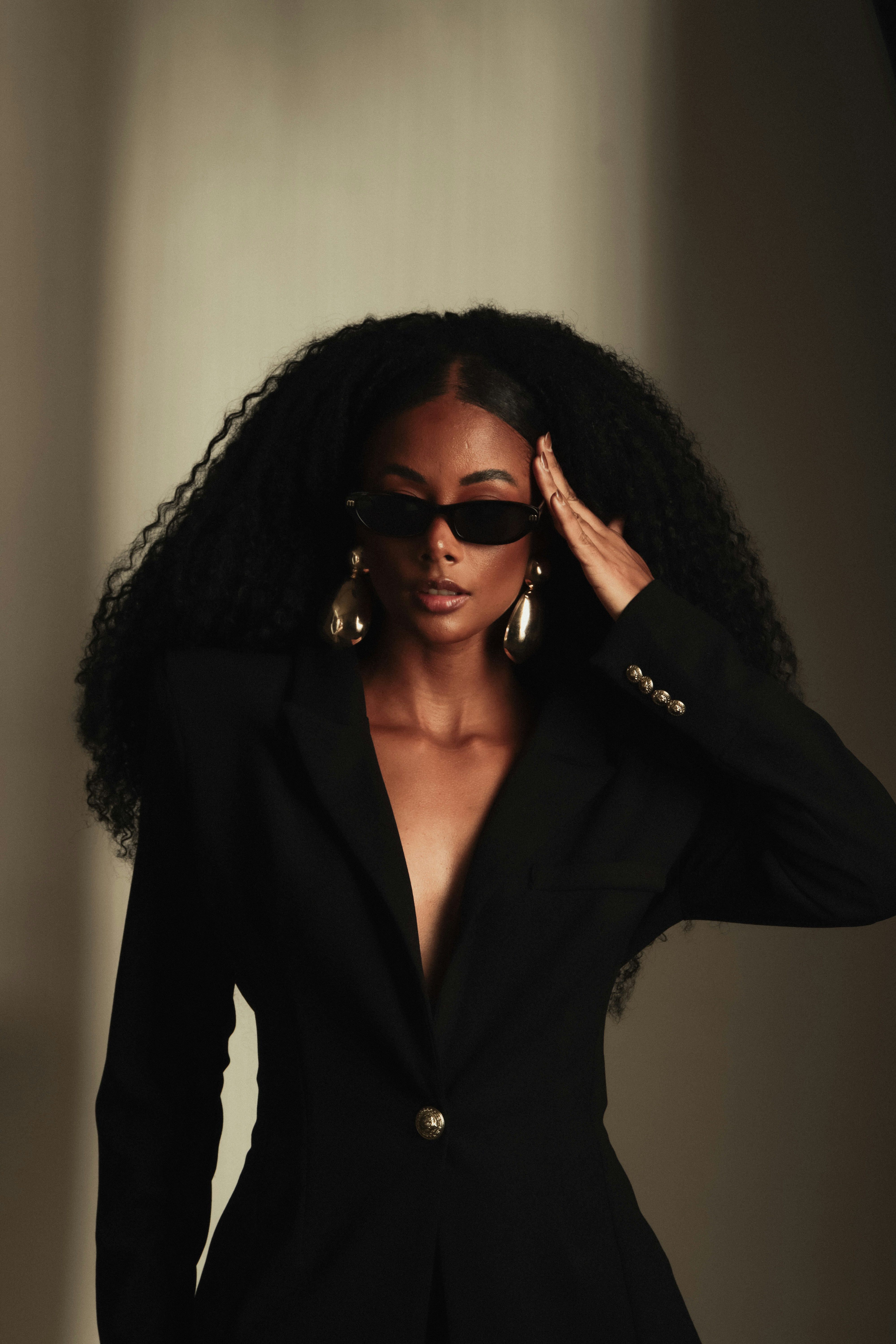 Powerful Silhouette: Sharp Suit, Soft Shadows