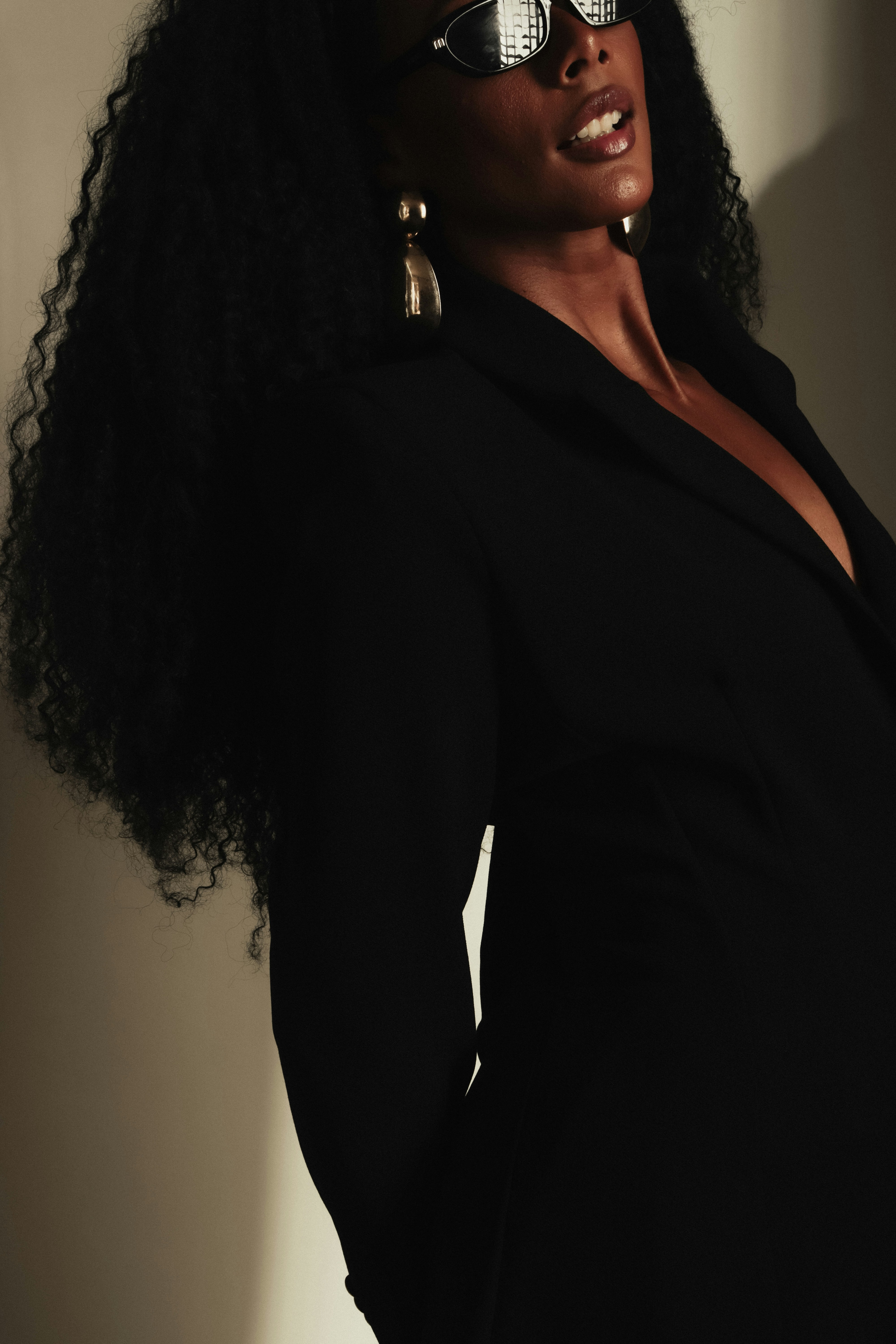 Shadowed Confidence: A Portrait in Velvet Black