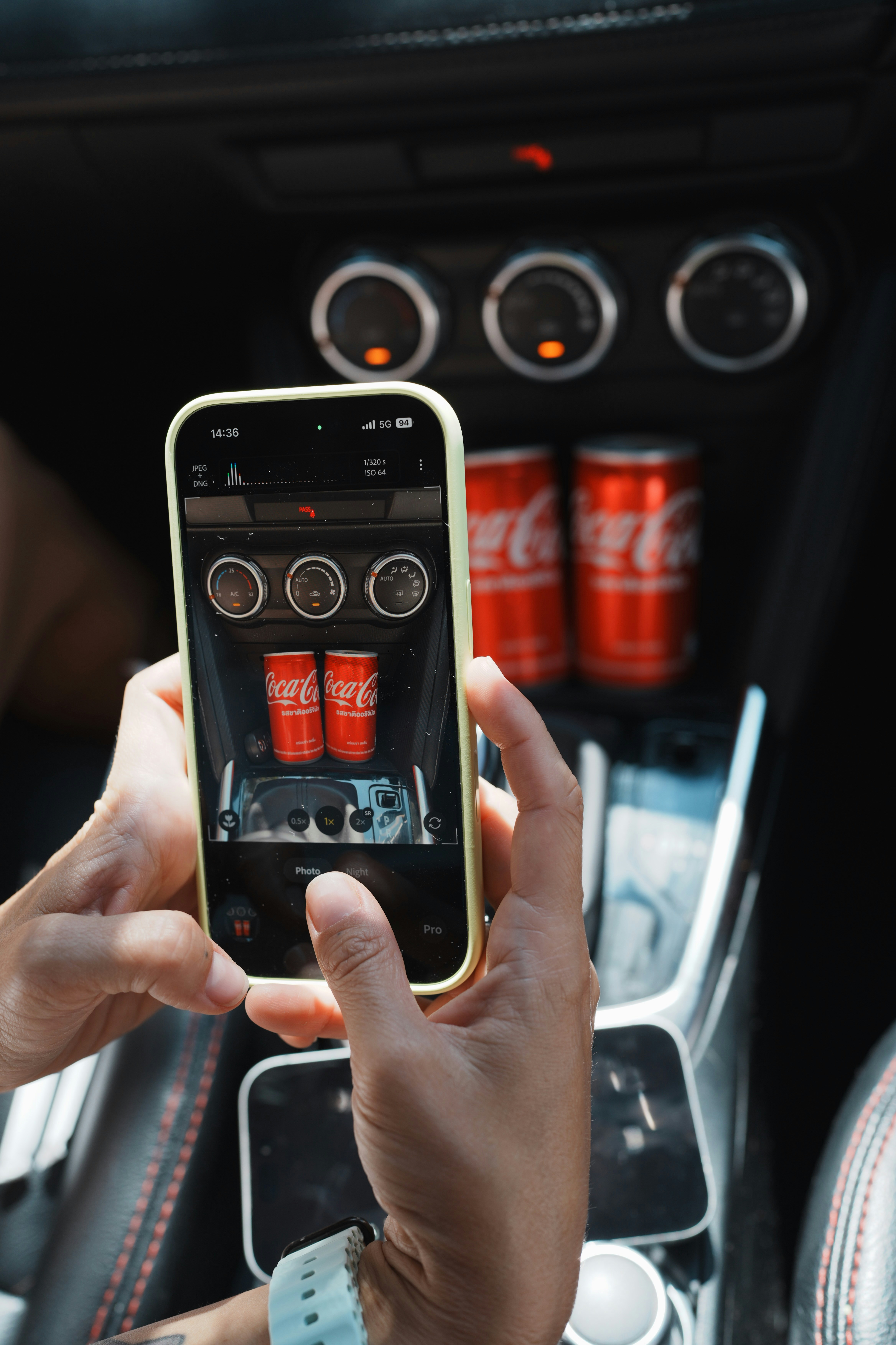 In-Camera Preview: Coca-Cola Can Panels Reflected in a Smartphone Framing