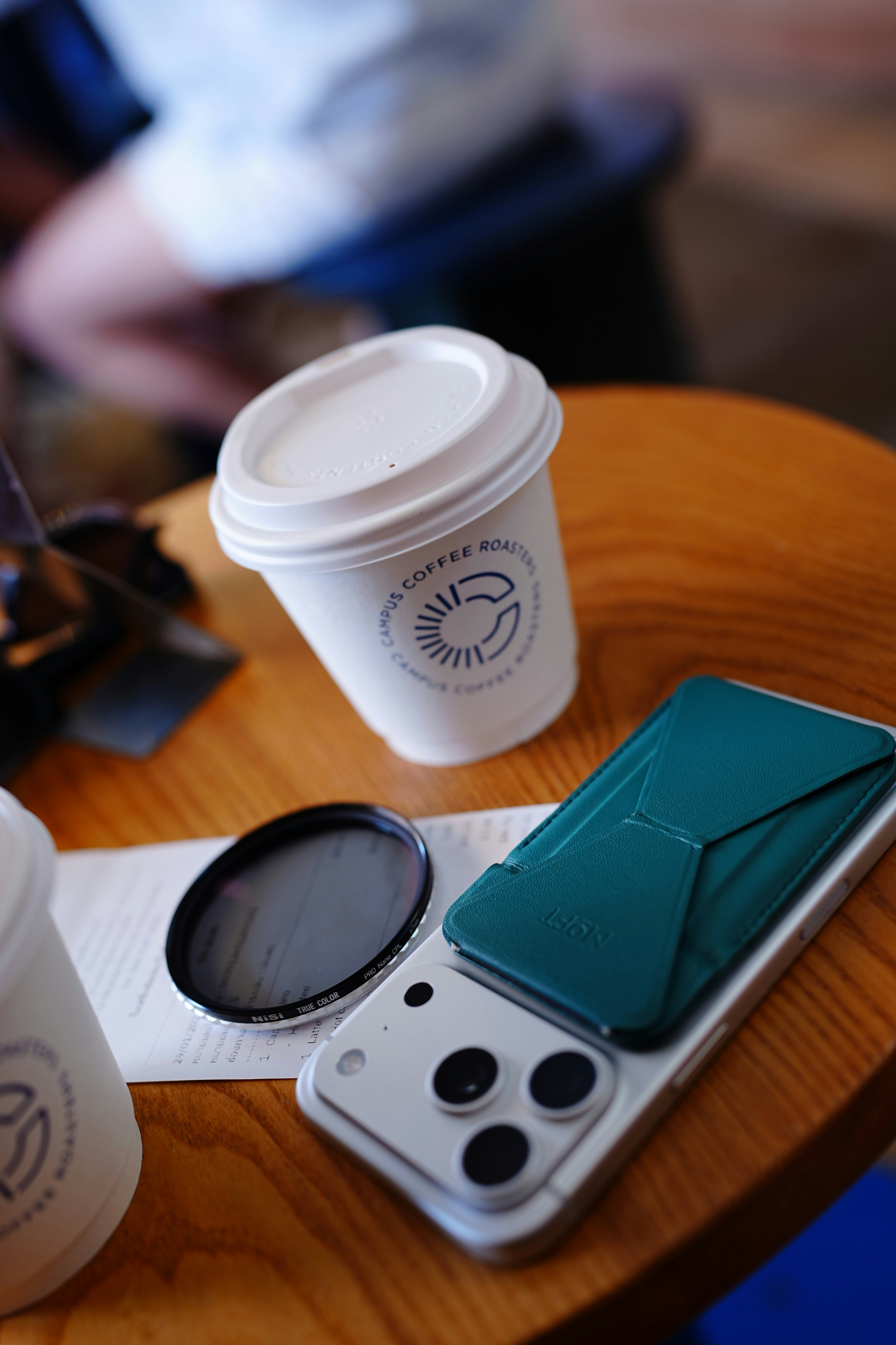 Coffee Break Portrait: A White Cup as the Centerpiece