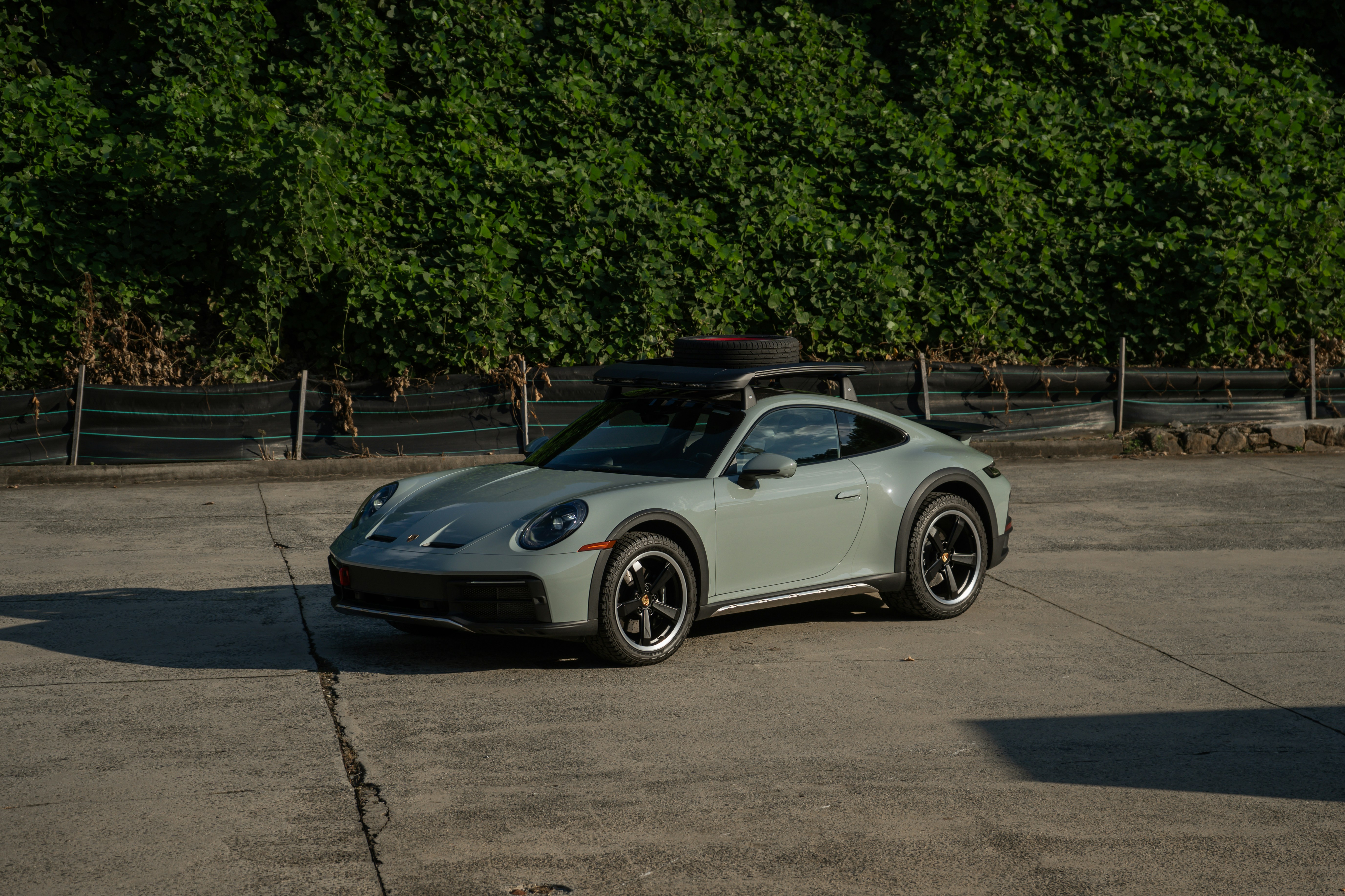 Green Porsche on a Quiet Runway: Calm Lines and Clean Light