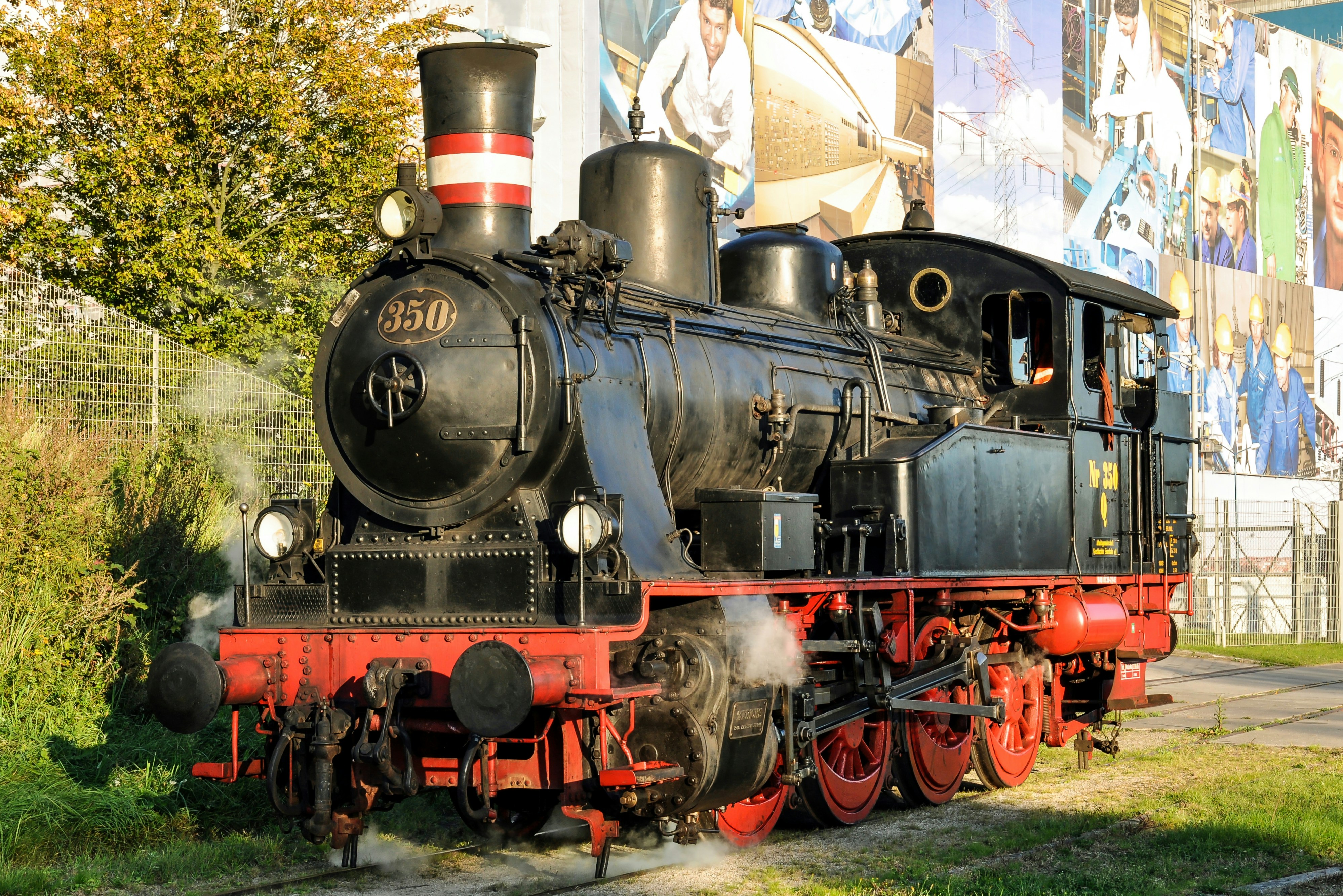 Crowd-Pulling Steam Sentinel: A Vintage Locomotive in Focus
