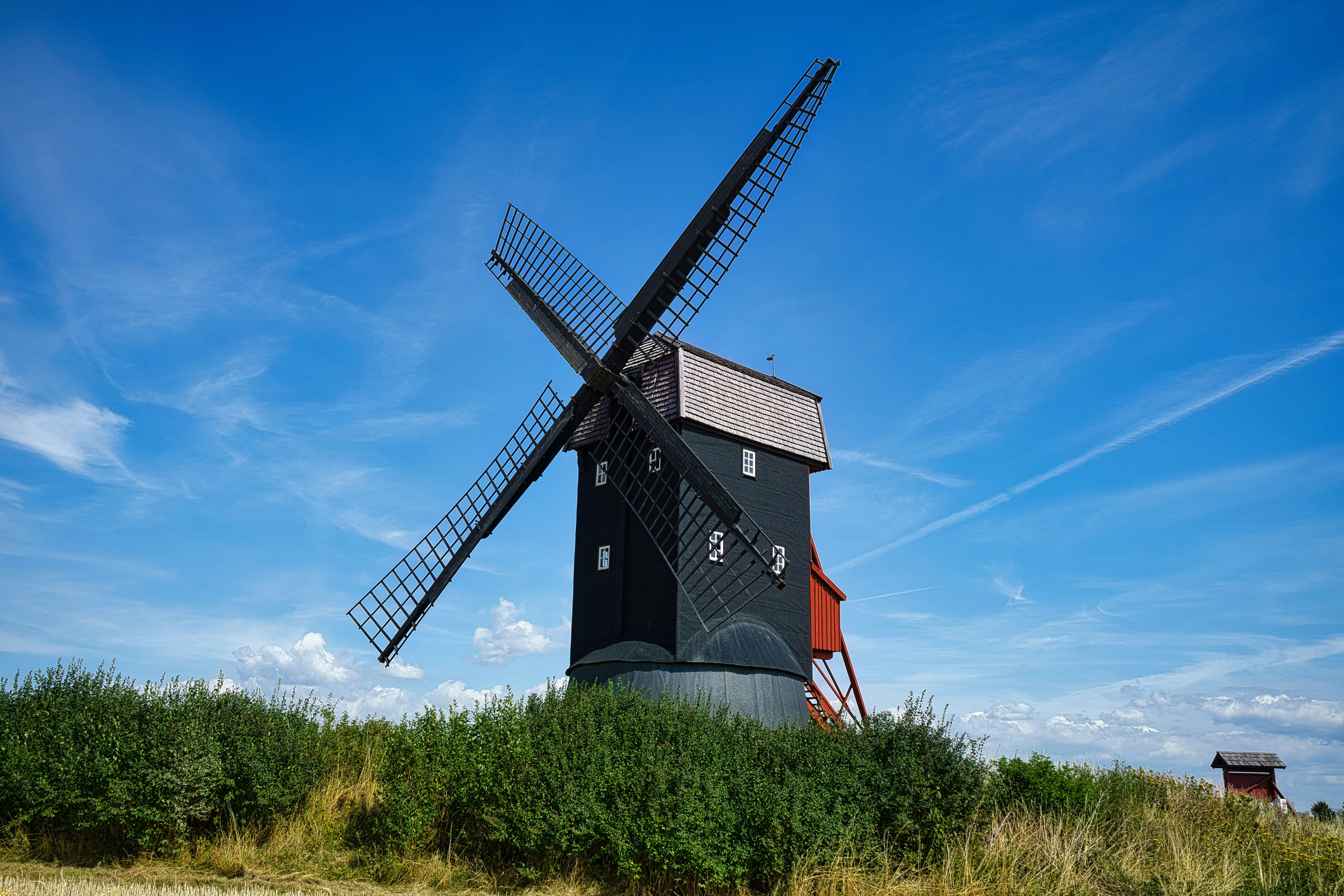 Windmill on the Hill: A Crisp Portrait of Power and Sky