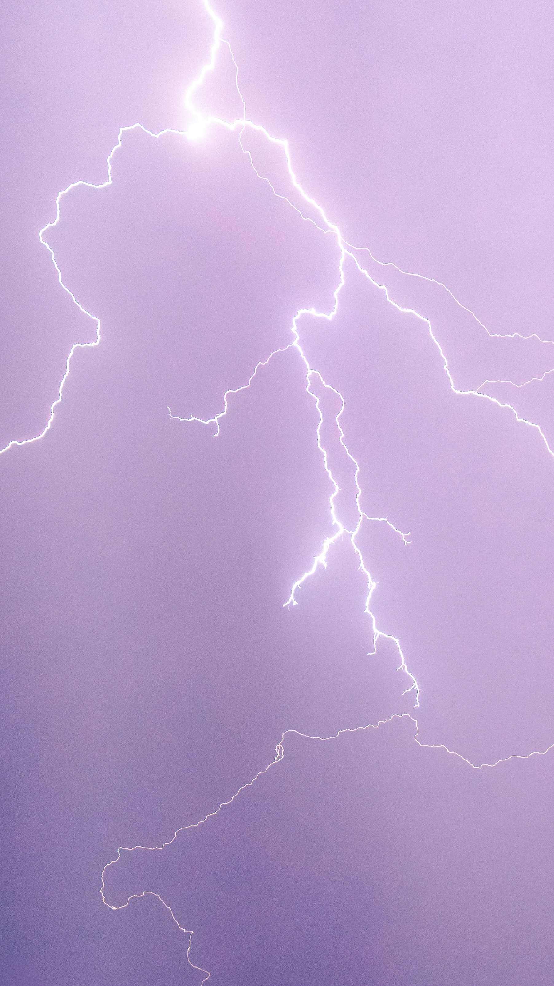 Purple Sky Lightning: A Branching Arc Across a Stormy Dreamscape