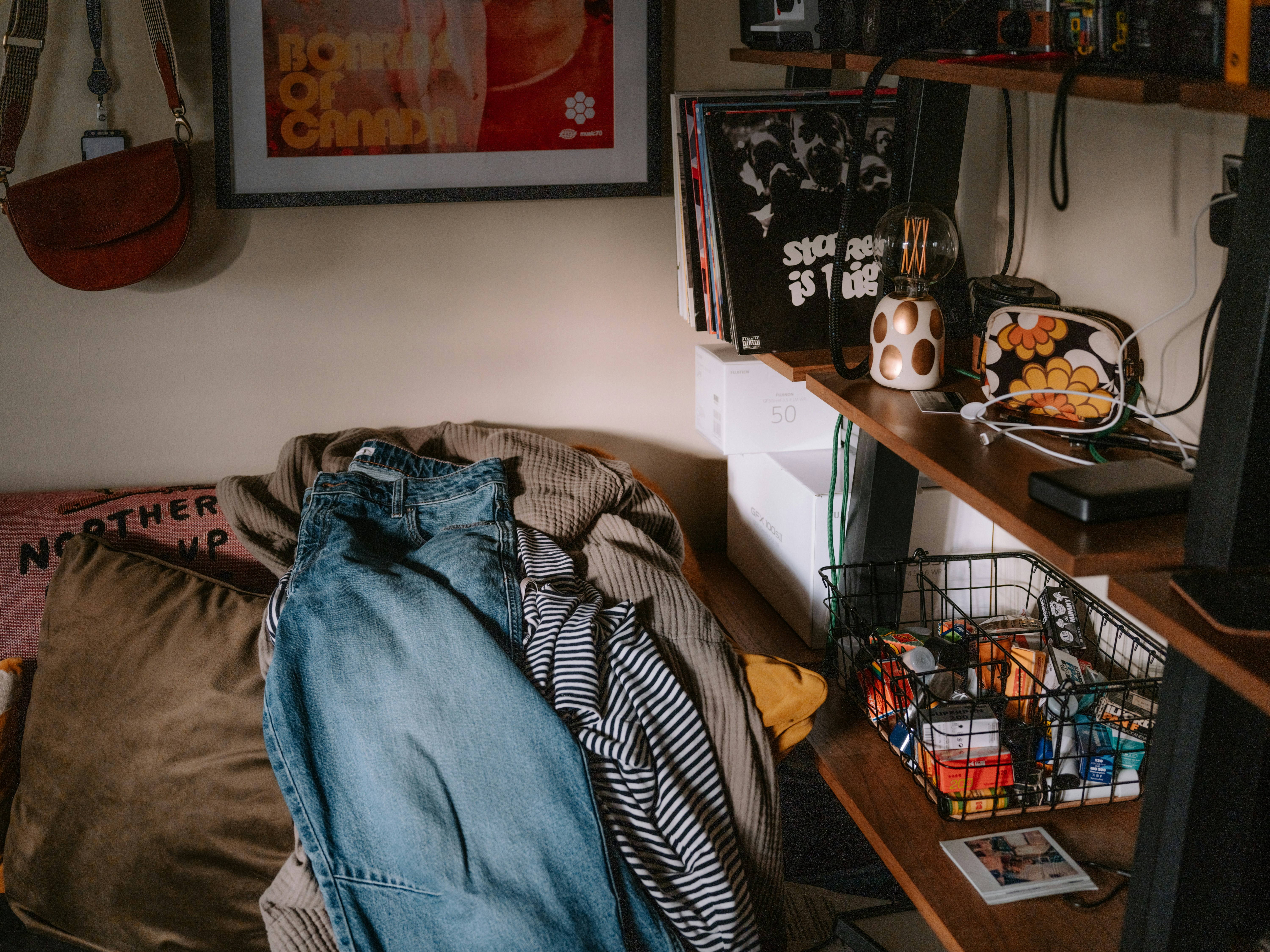Cozy Desk Nook with Folded Denim and Vintage Finds