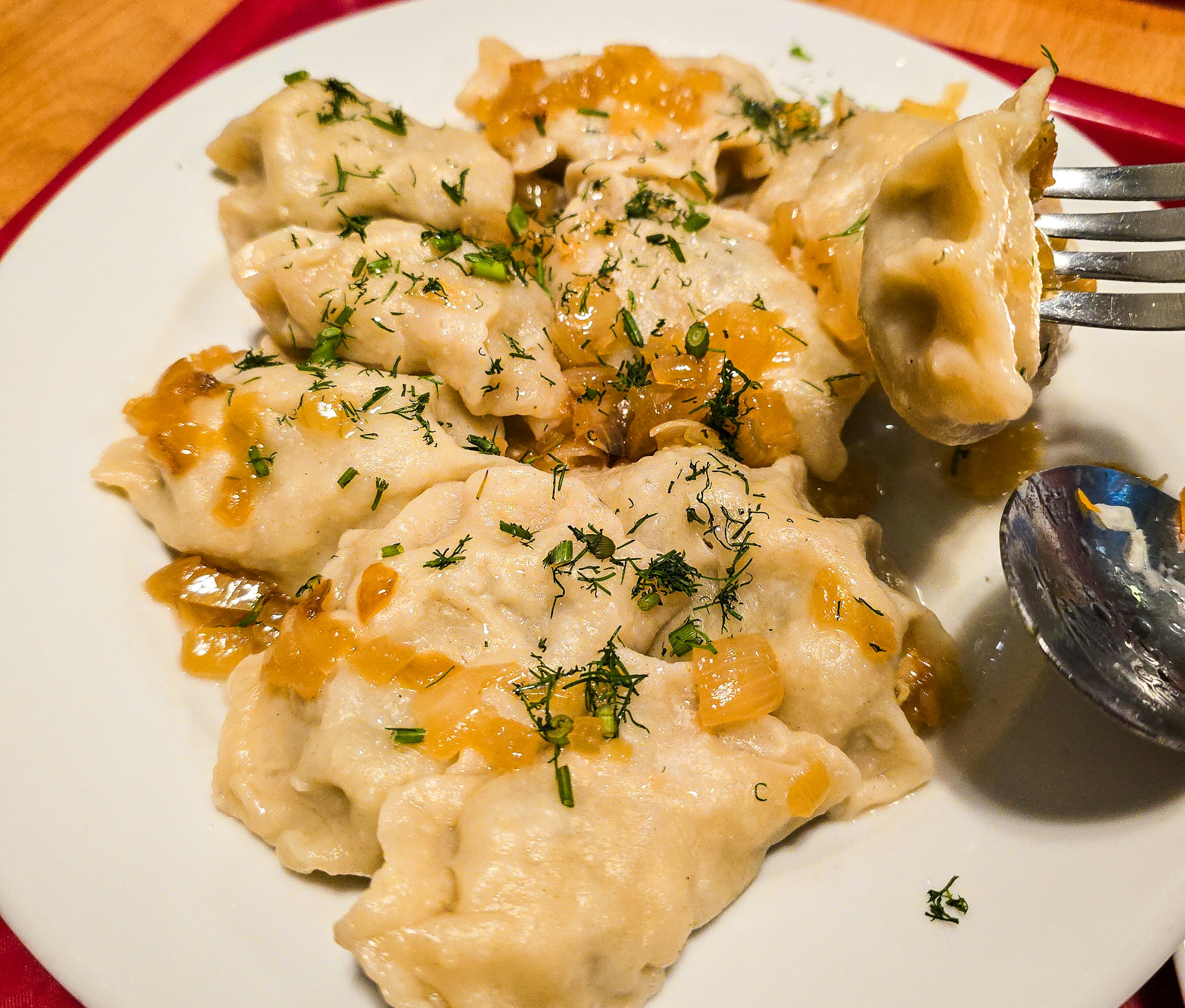 Dumplings on a Plate: Savory Steam with Herb Garnish