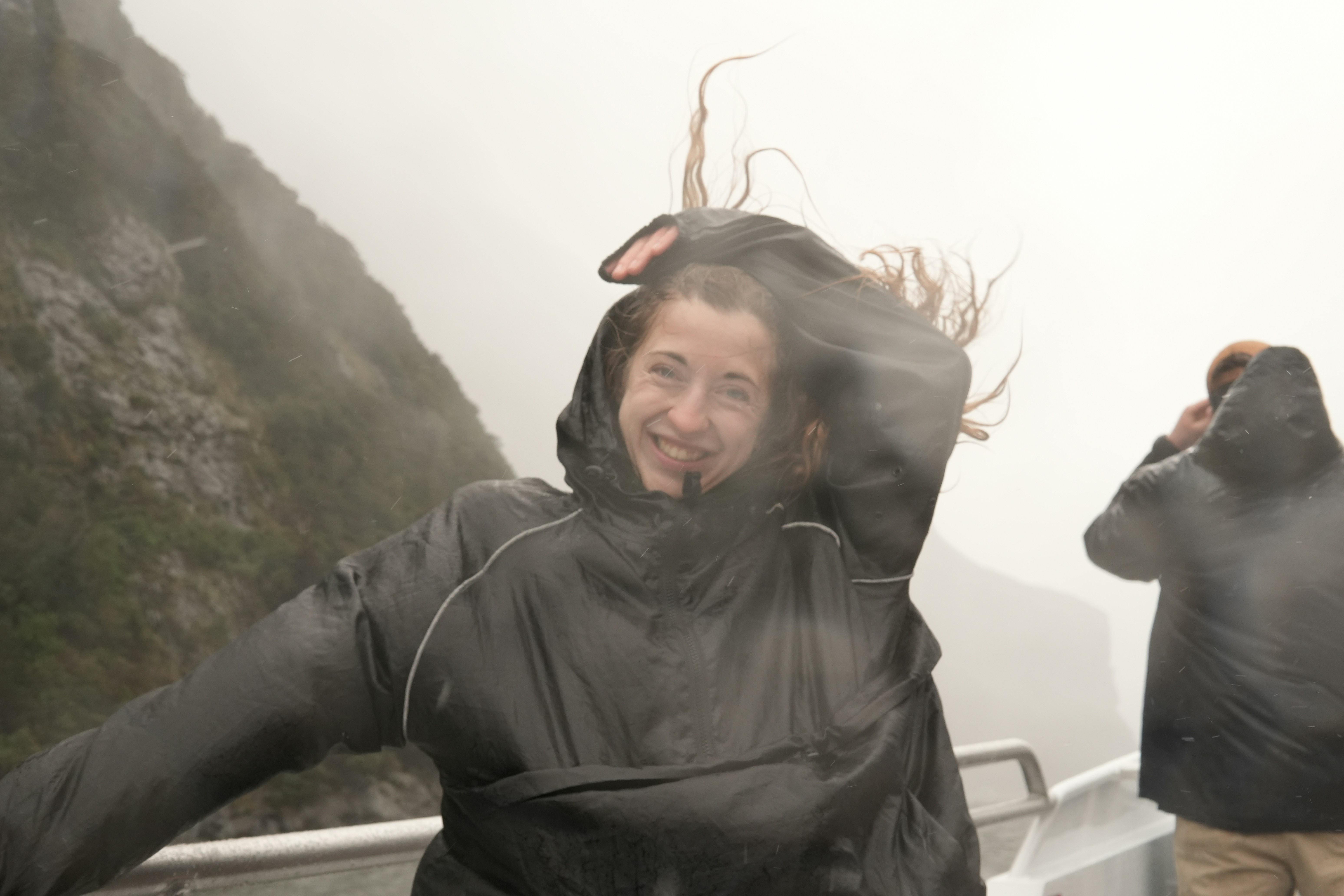 Windy Grin on a Cliffside Ferry