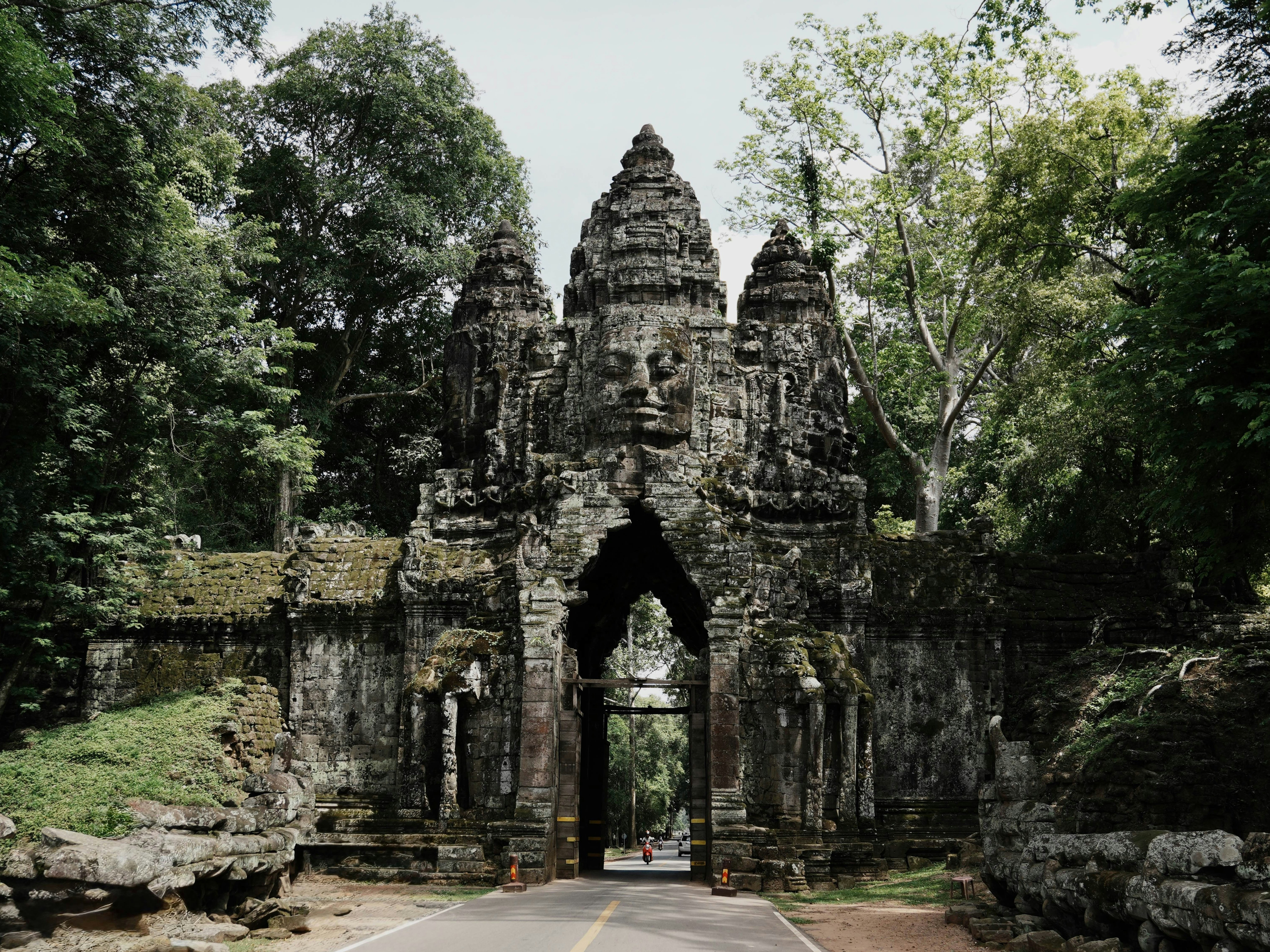 Entranced Gate: Stone Towers Framed by Foliage