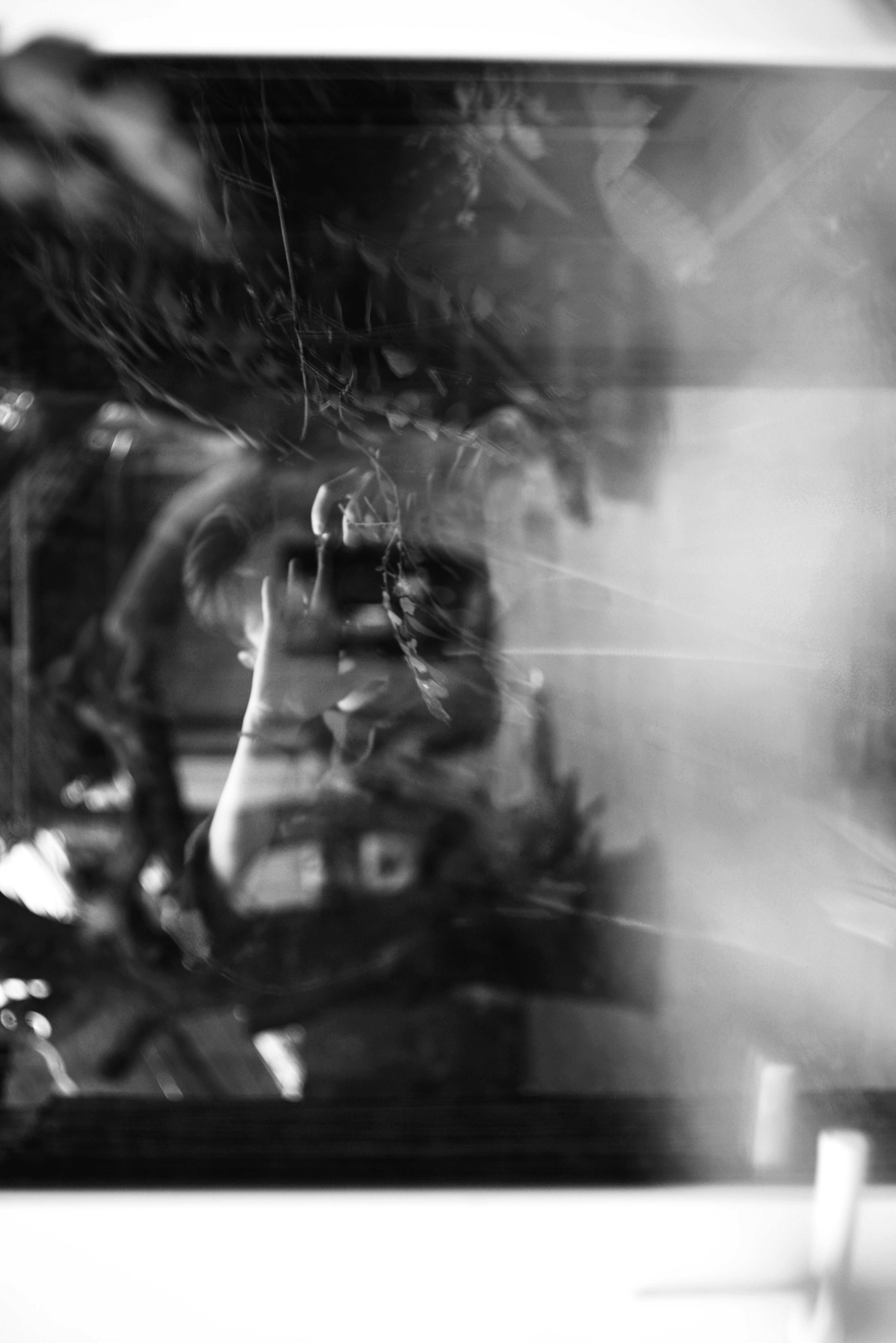 Mirror Frame: A Play of Hands and Light in an Urban Reflection