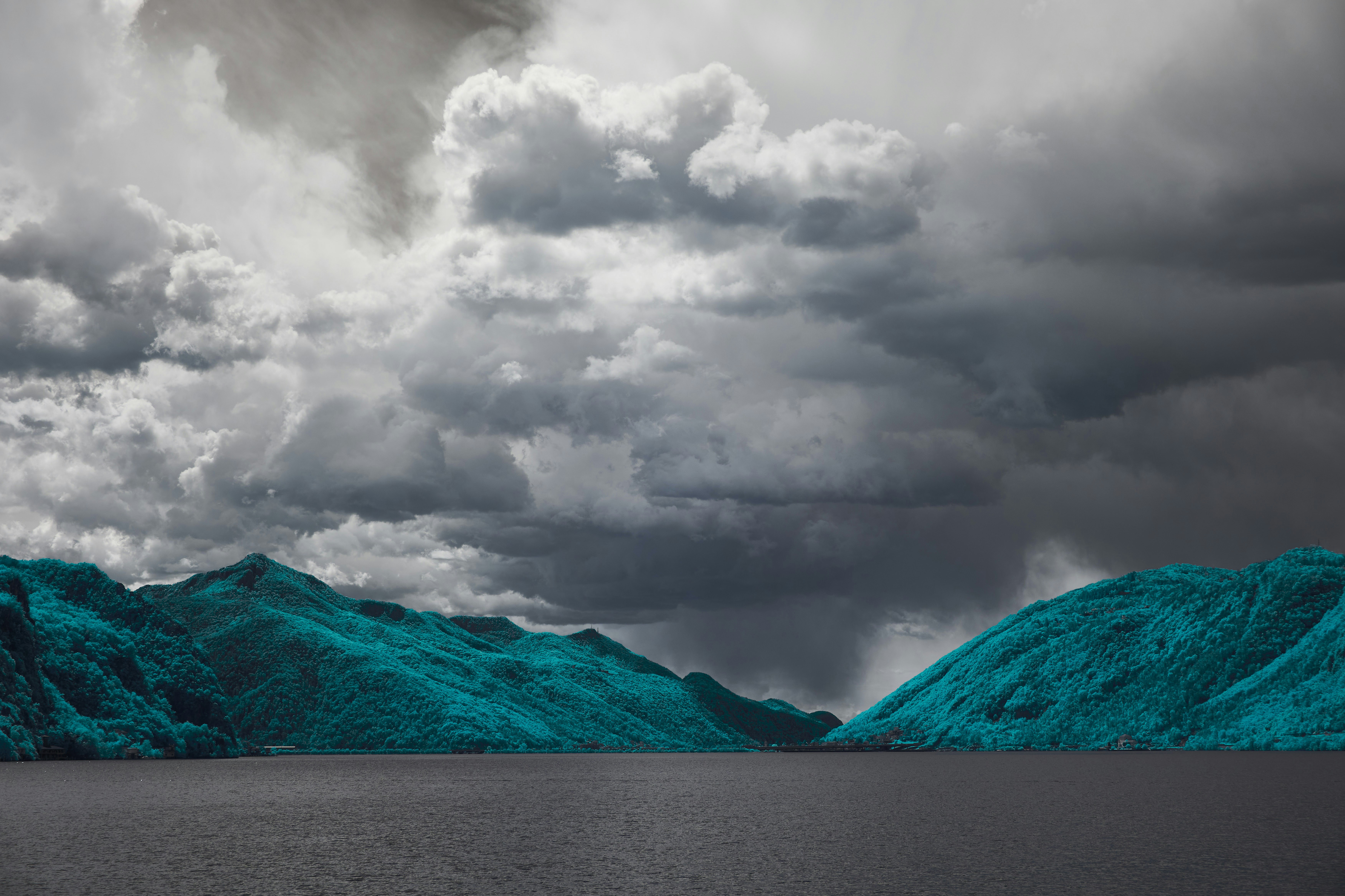 A moody fjord under dramatic skies