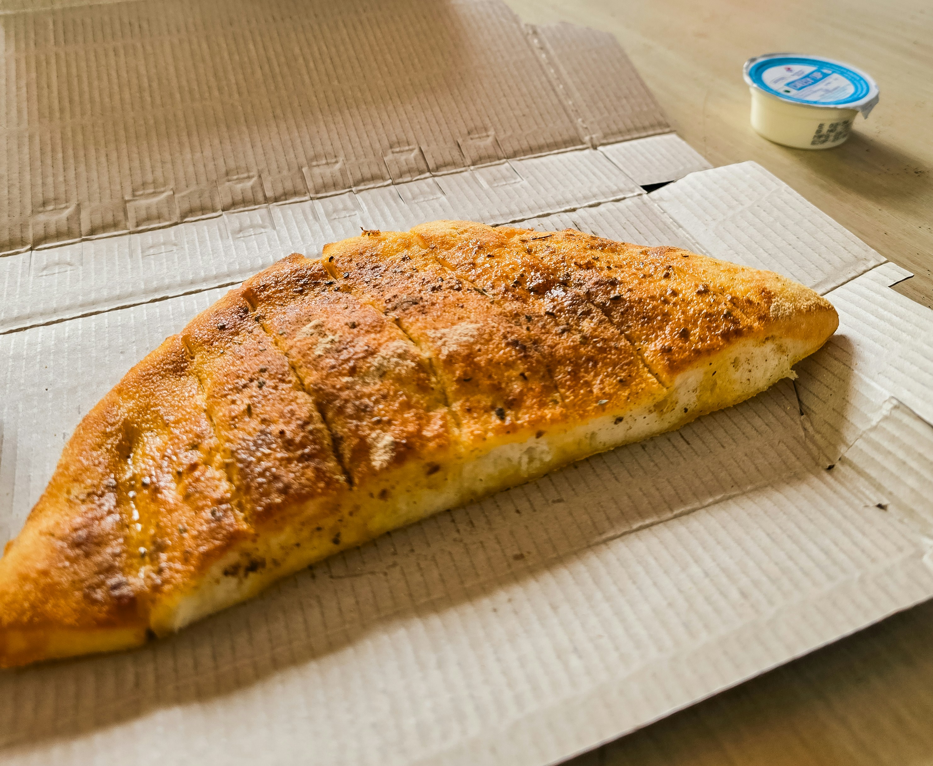 Golden Crescent Pastry on Corrugated Cardboard