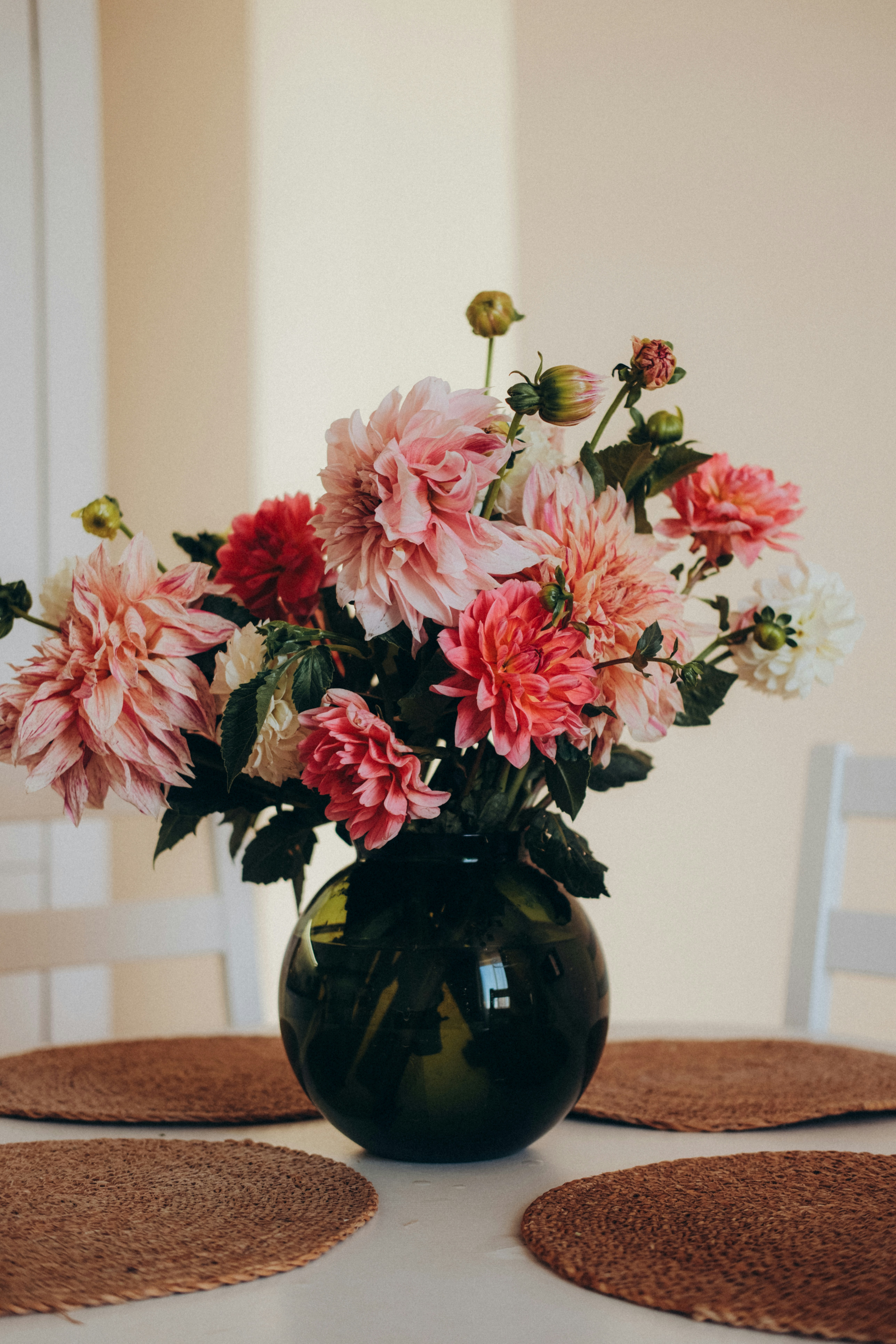 Bouquet in a Dark Globe Vase:Soft Light, Bold Petals