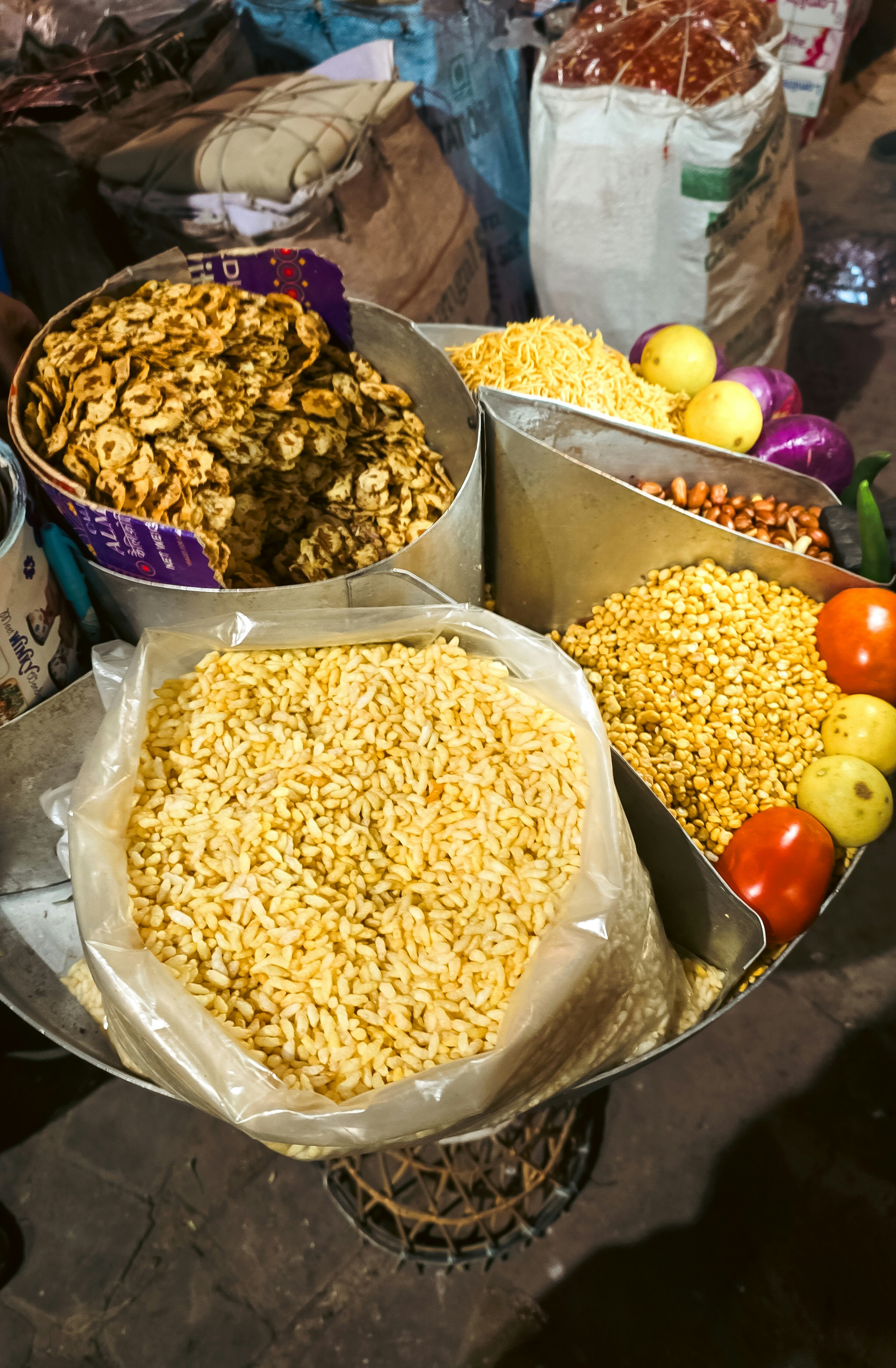 Golden Kernels and Crunchy Riches: A Market Tray of Nuts, Grains, and Fresh Produce