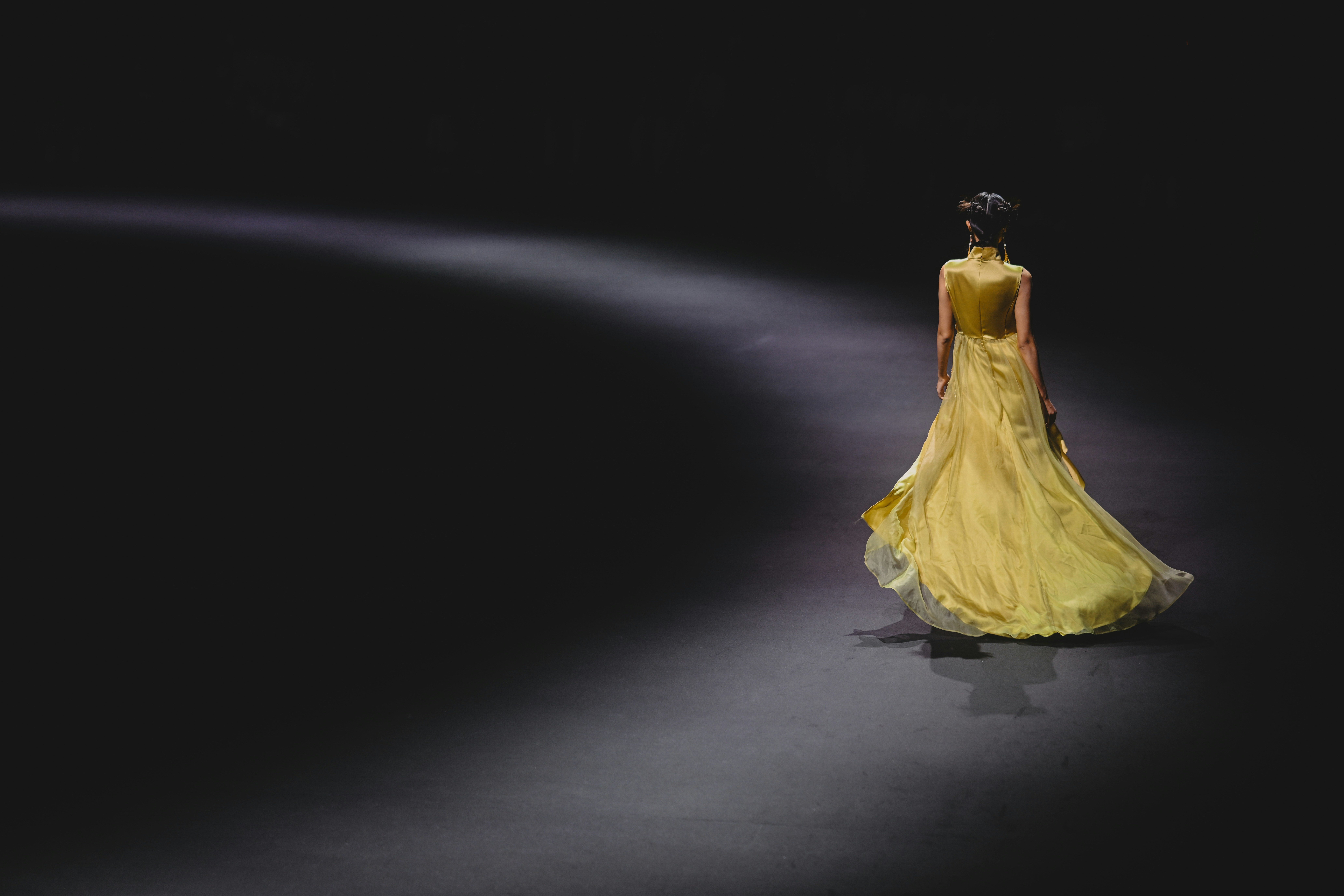 Yellow-Gown Reverie on a Spotlight Path