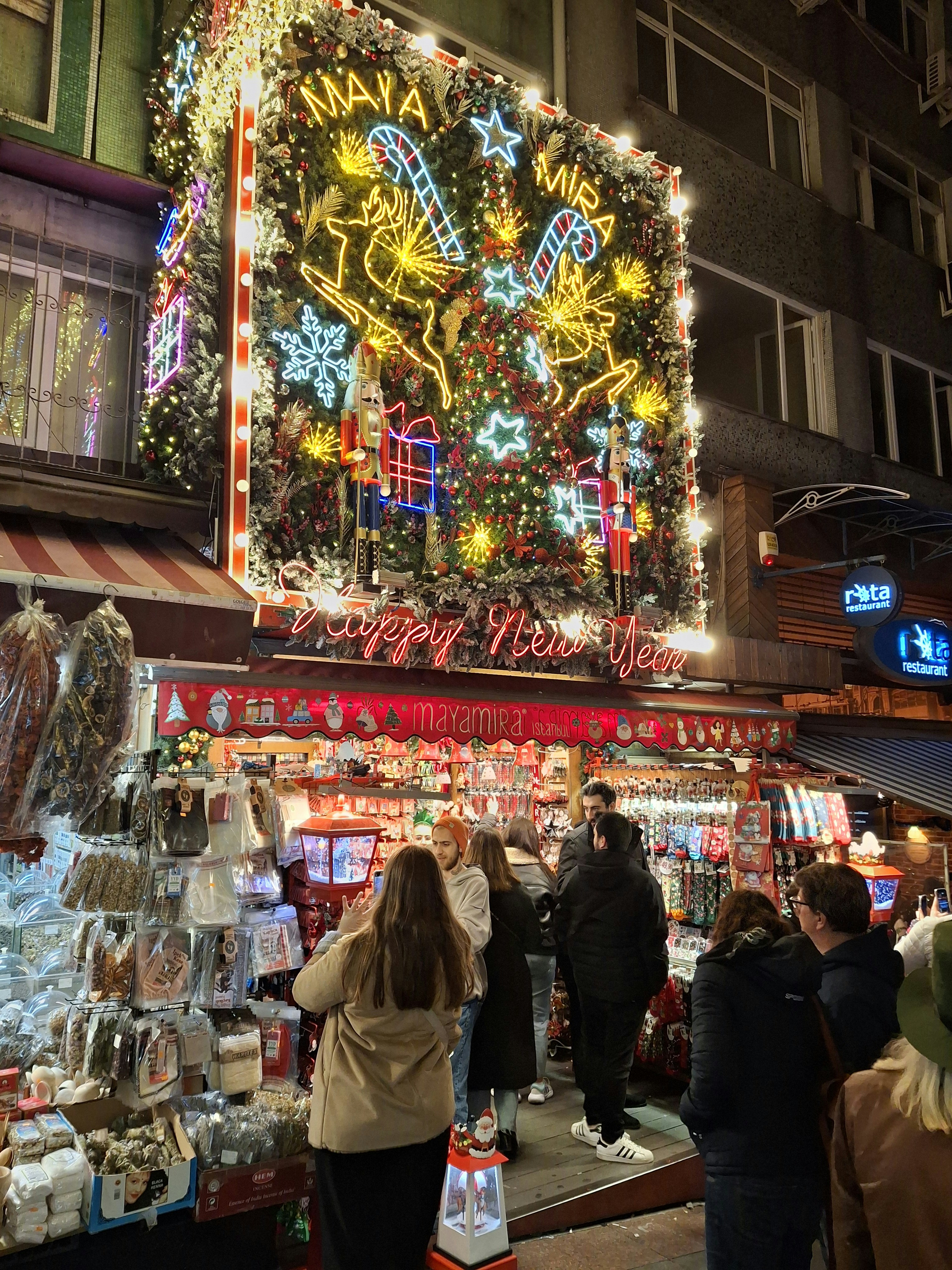 New Year Neon: Festive Market Under a Glowing Ornamented Facade