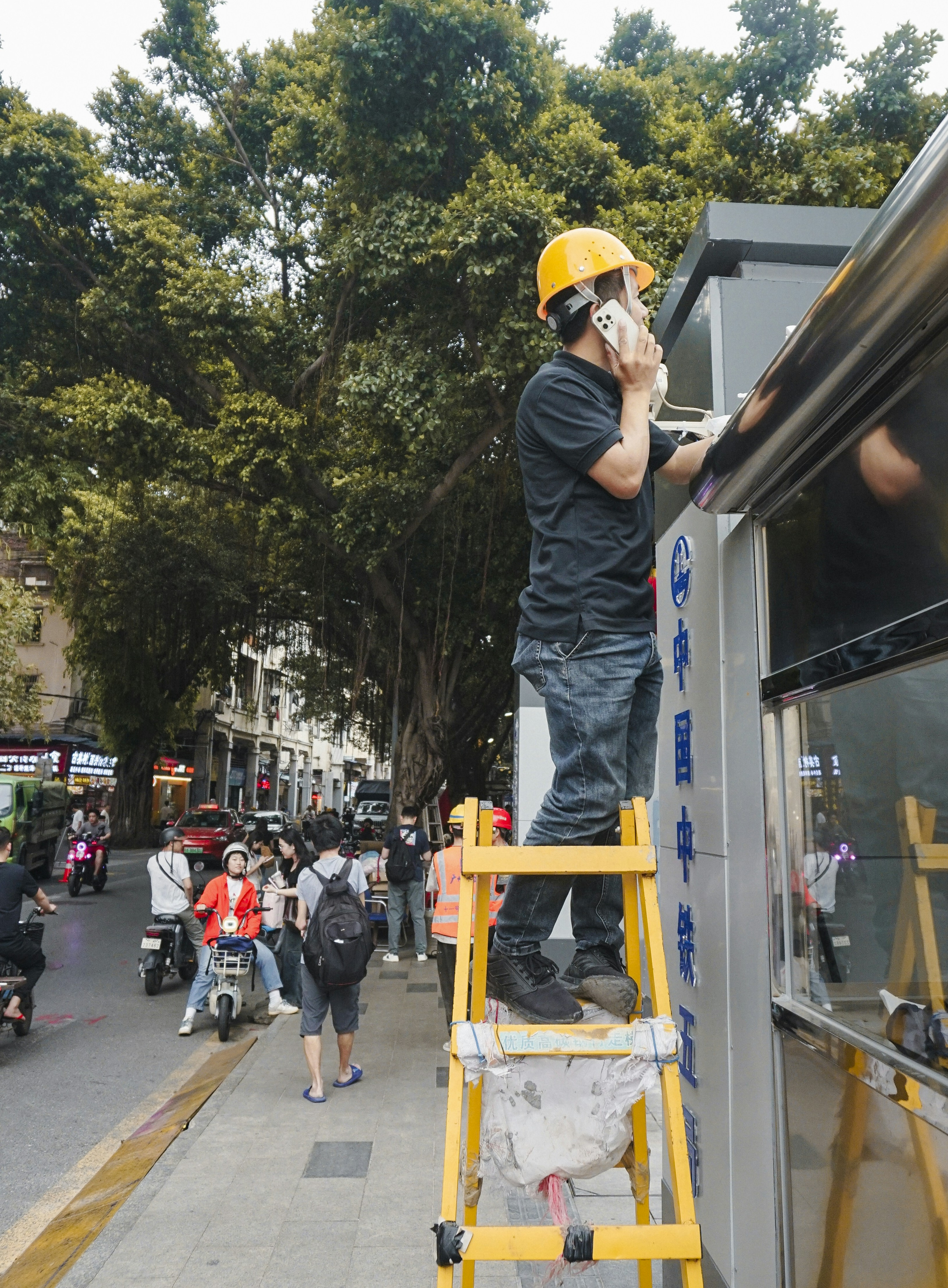 Construction worker check on phone call
