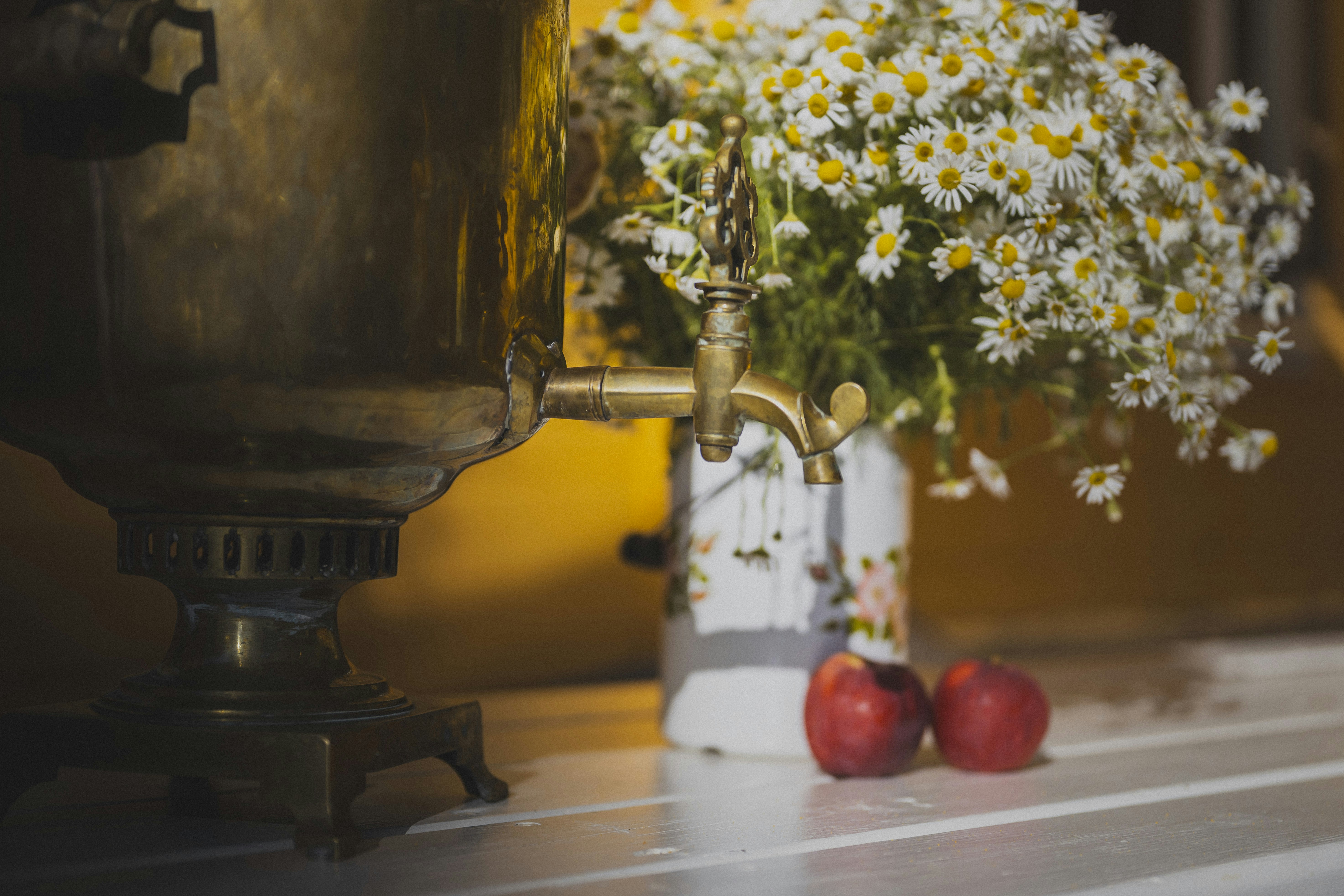 Ceremonial Tap, Daisies, and Two Red Apples