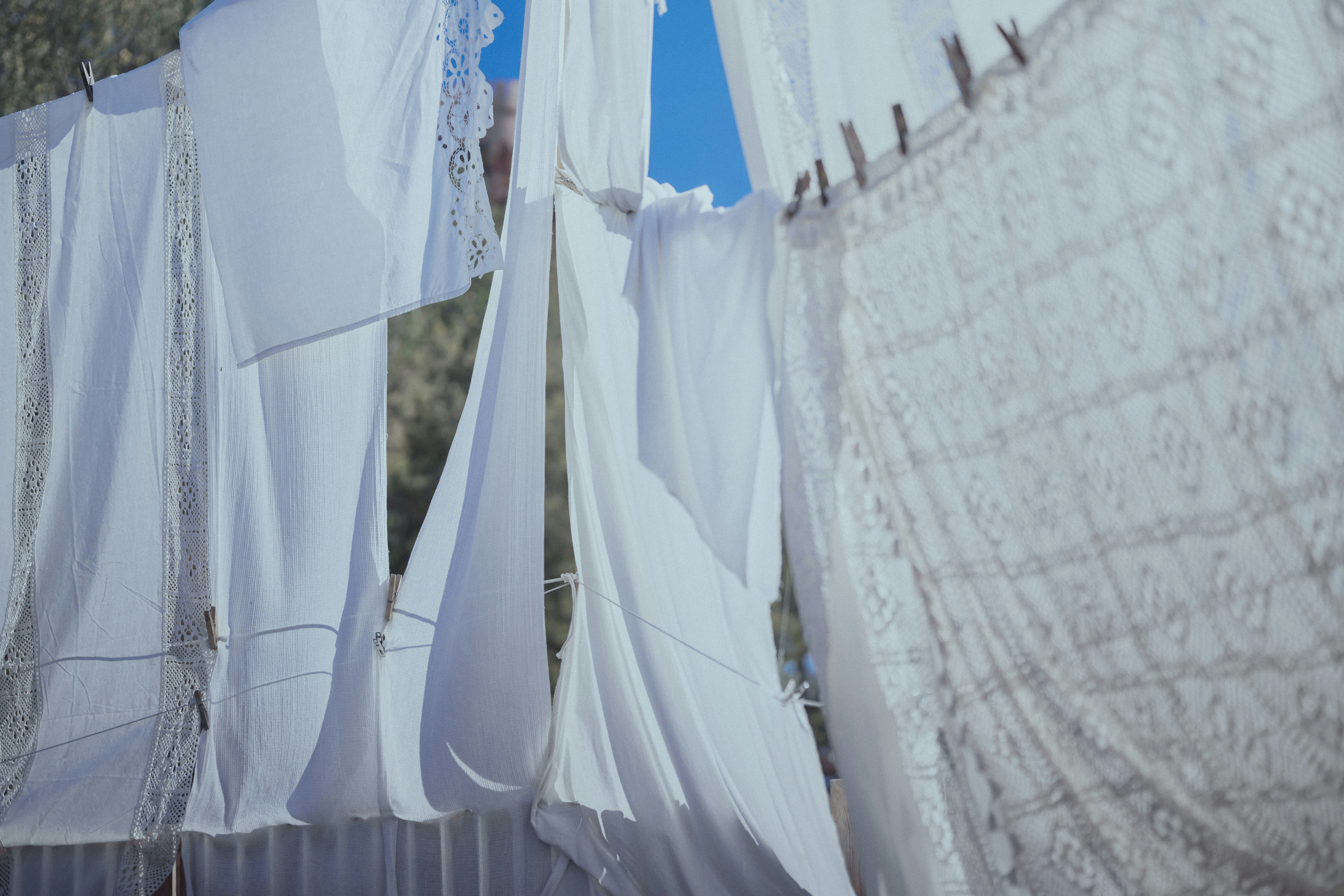 White Laundry in Sunlit Line on a Clothesline