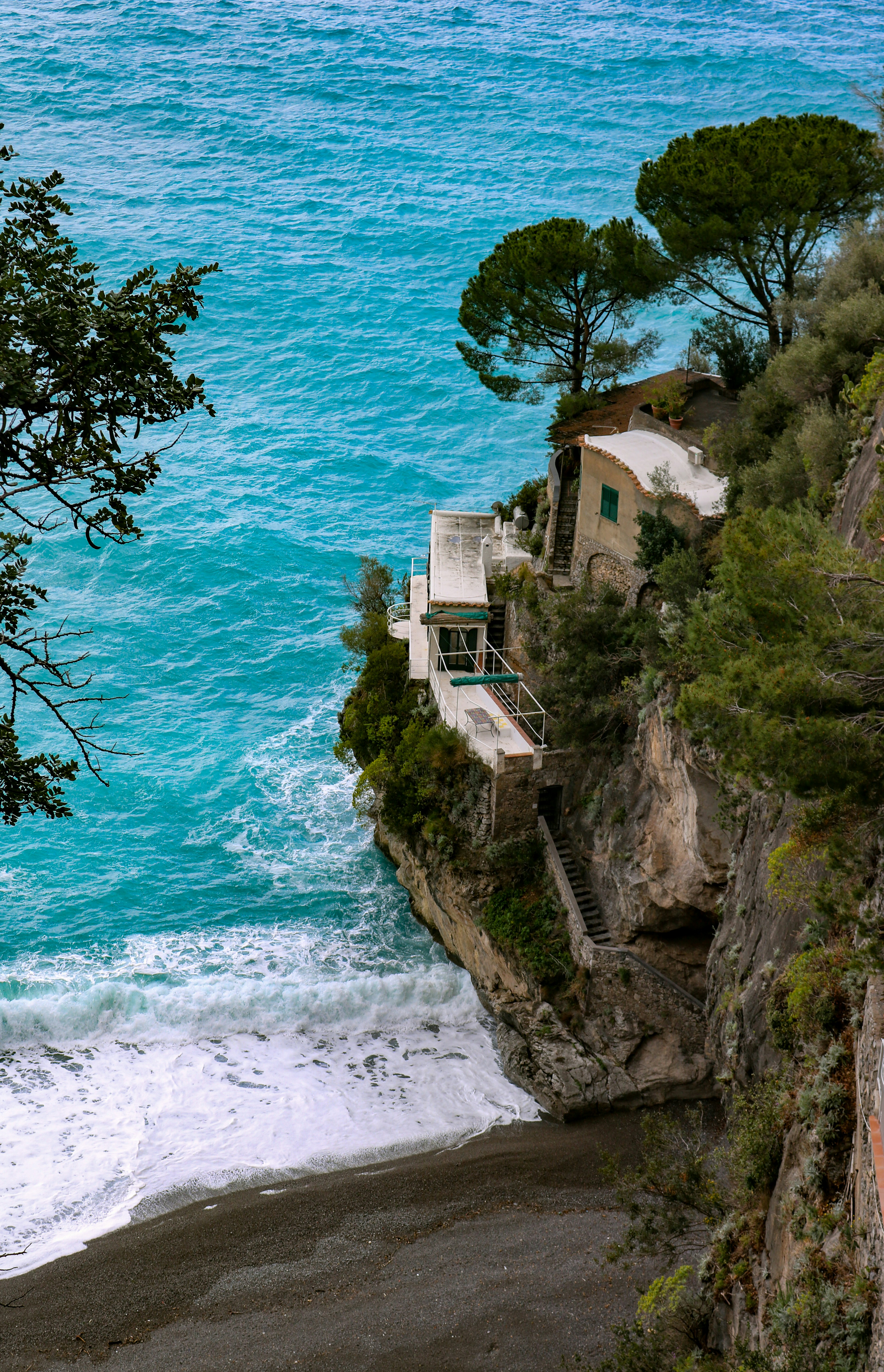Clifftop Retreat: A Stone House Clinging to the Sea Edge