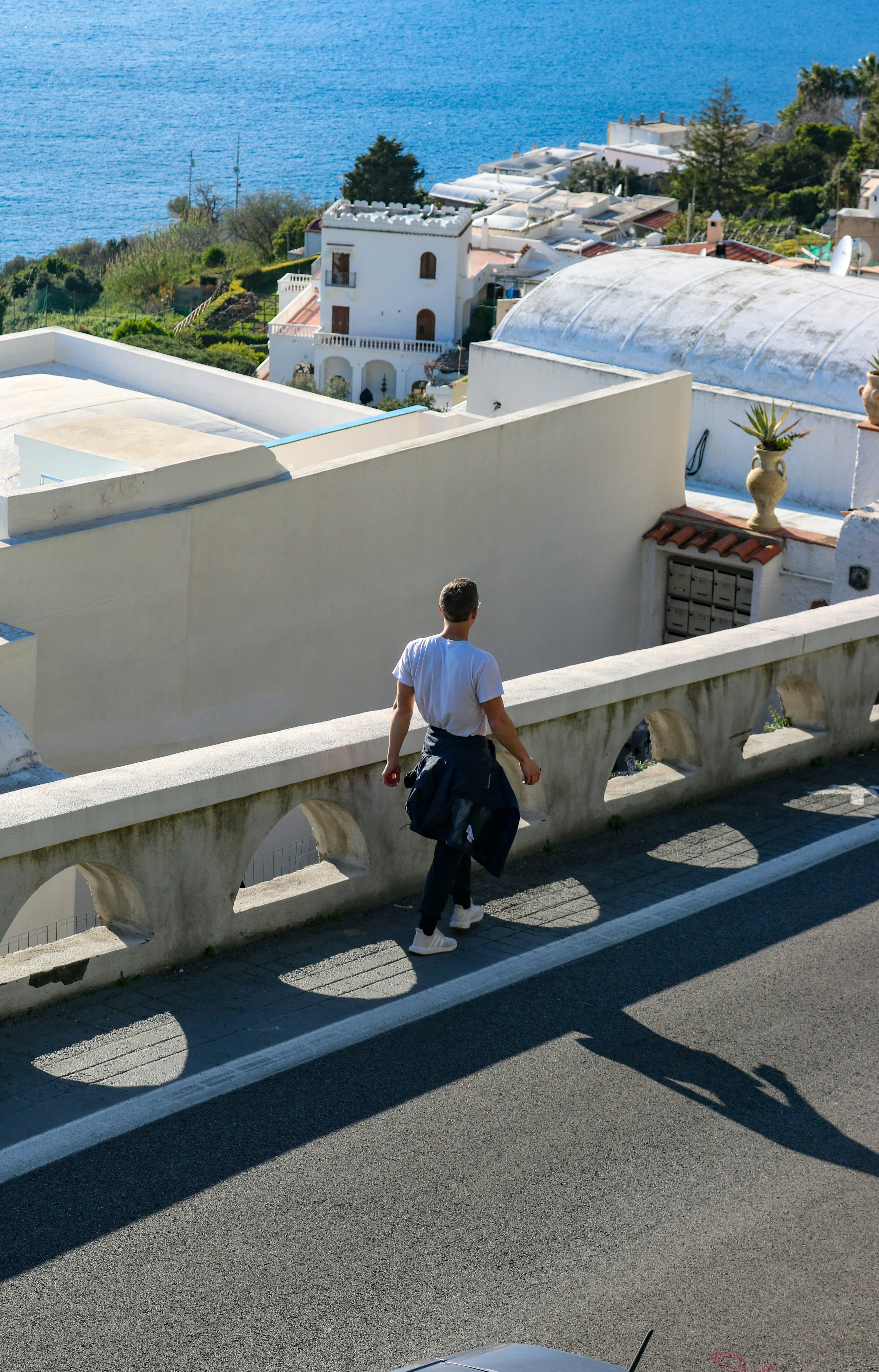 Strolling Along the White Terrace: A Sea-View Walk Amid Mediterranean Architecture