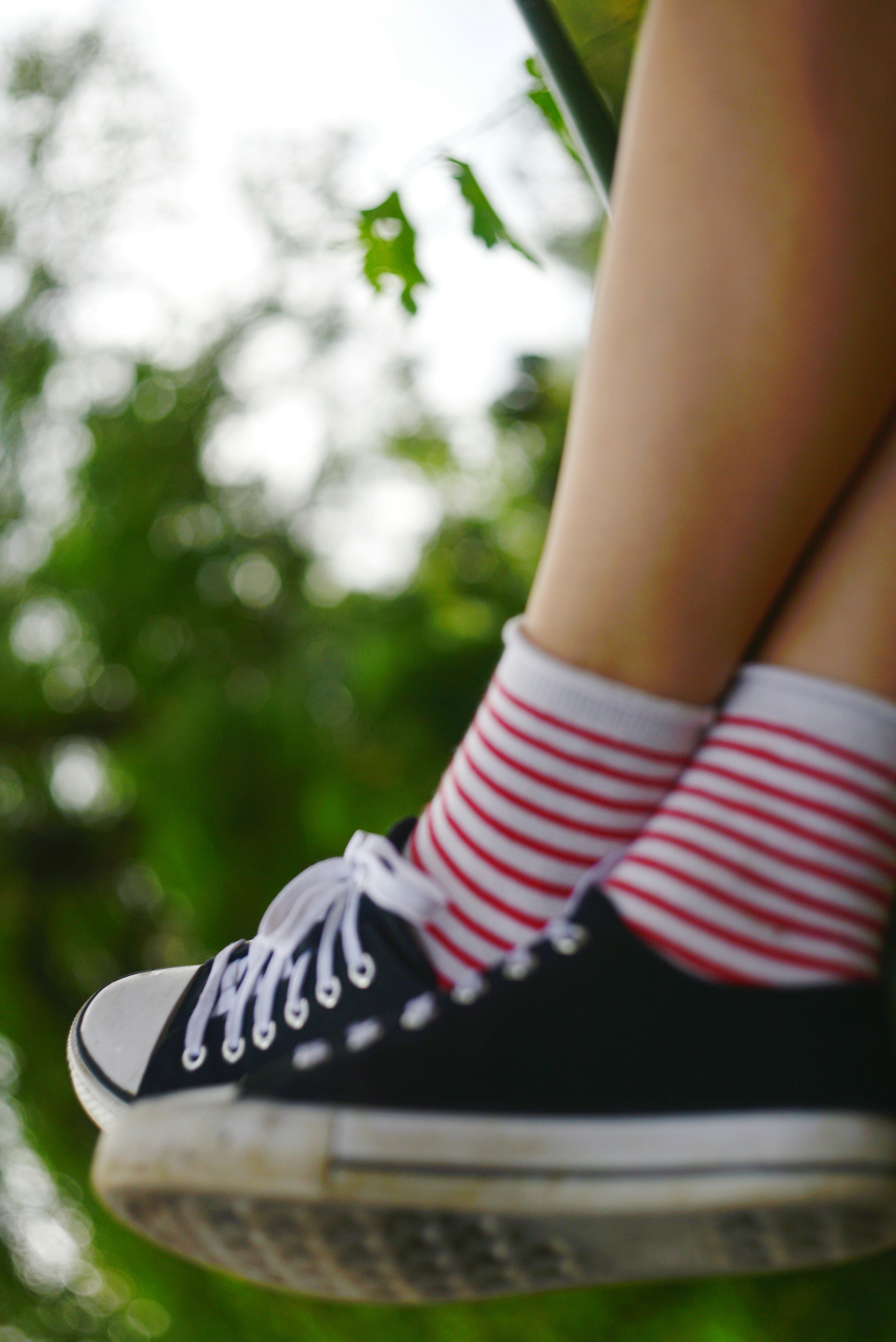 Low-Angle Converse: Laces, Stripes, and Green Blur