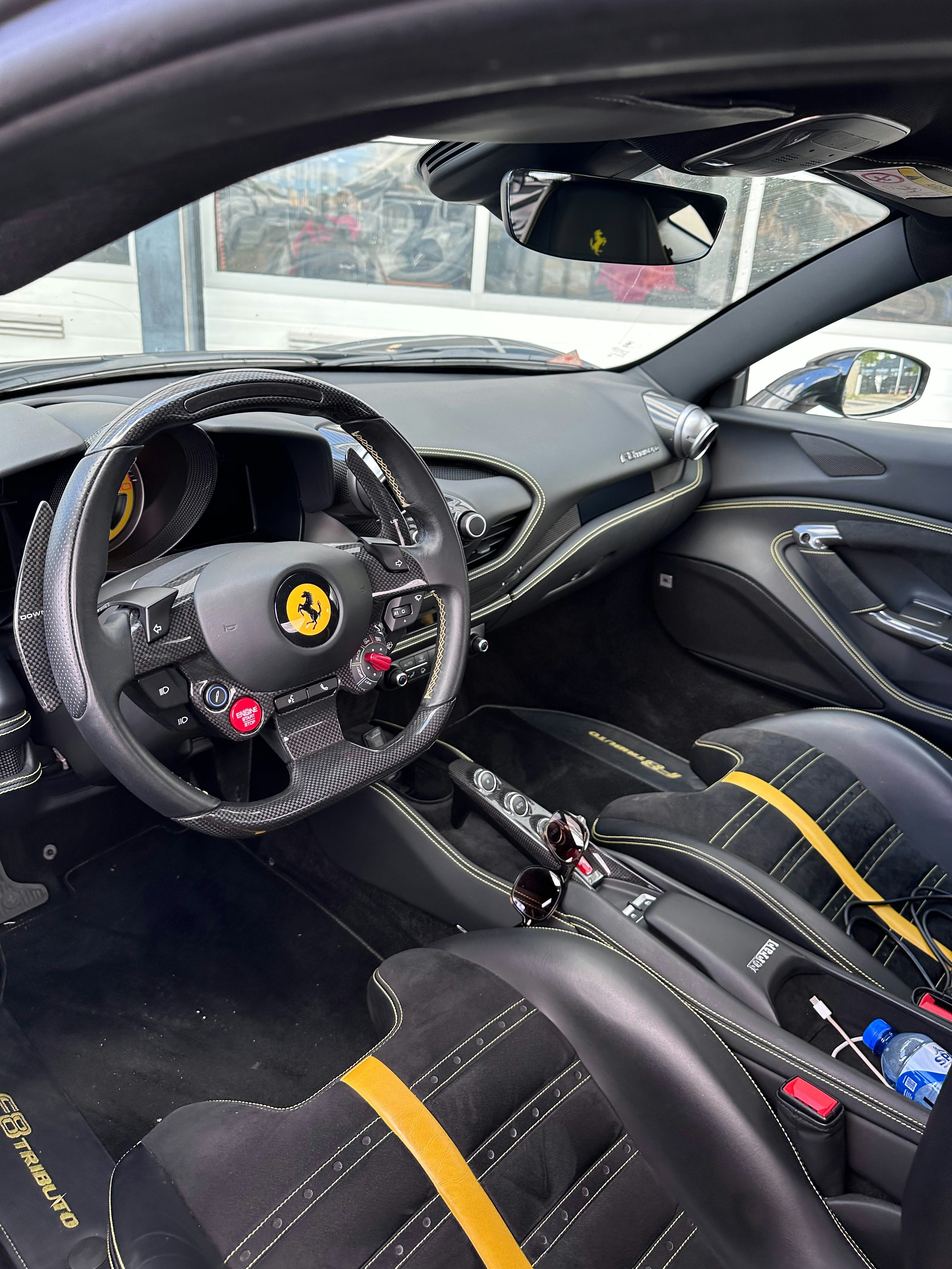 Ferrari Cockpit in Motion: Raging Carbon and Yellow Straps