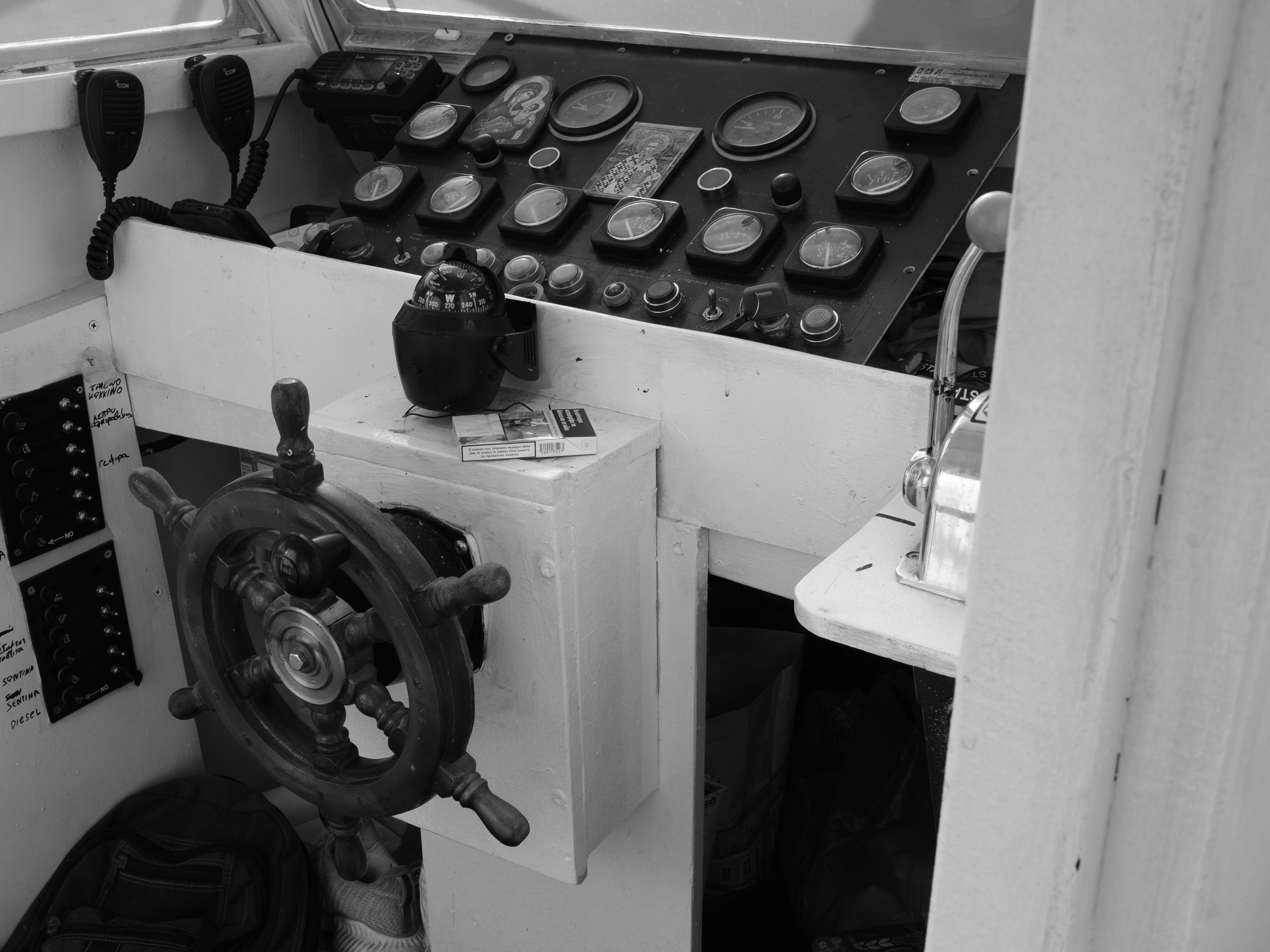 Bridge Console: Hands on the Wheel of a Vessel