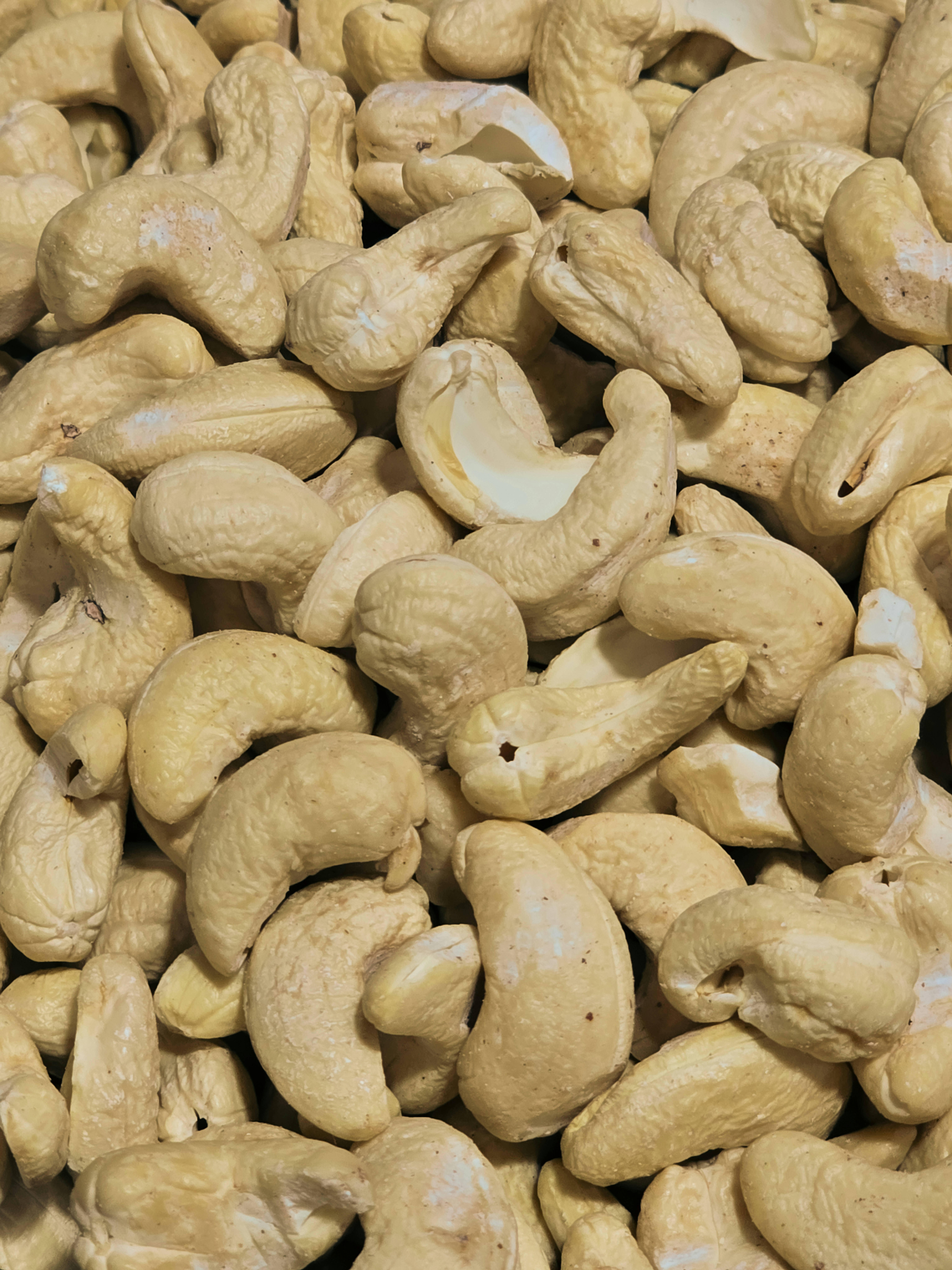 Golden Cashews: A Sea of Curved Peels