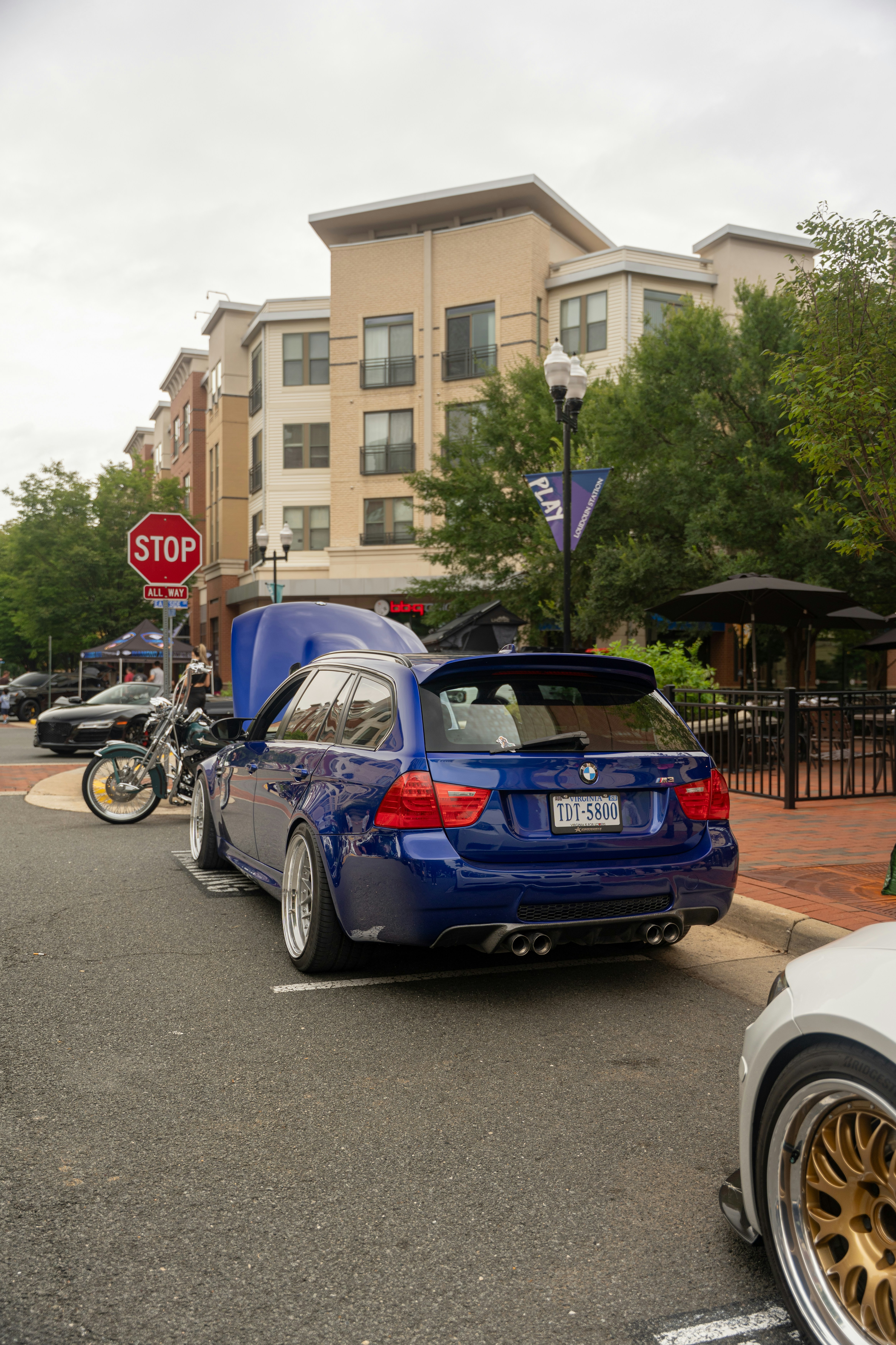 Blue BMW Avalanche of Street Style in a Cozy Urban Block