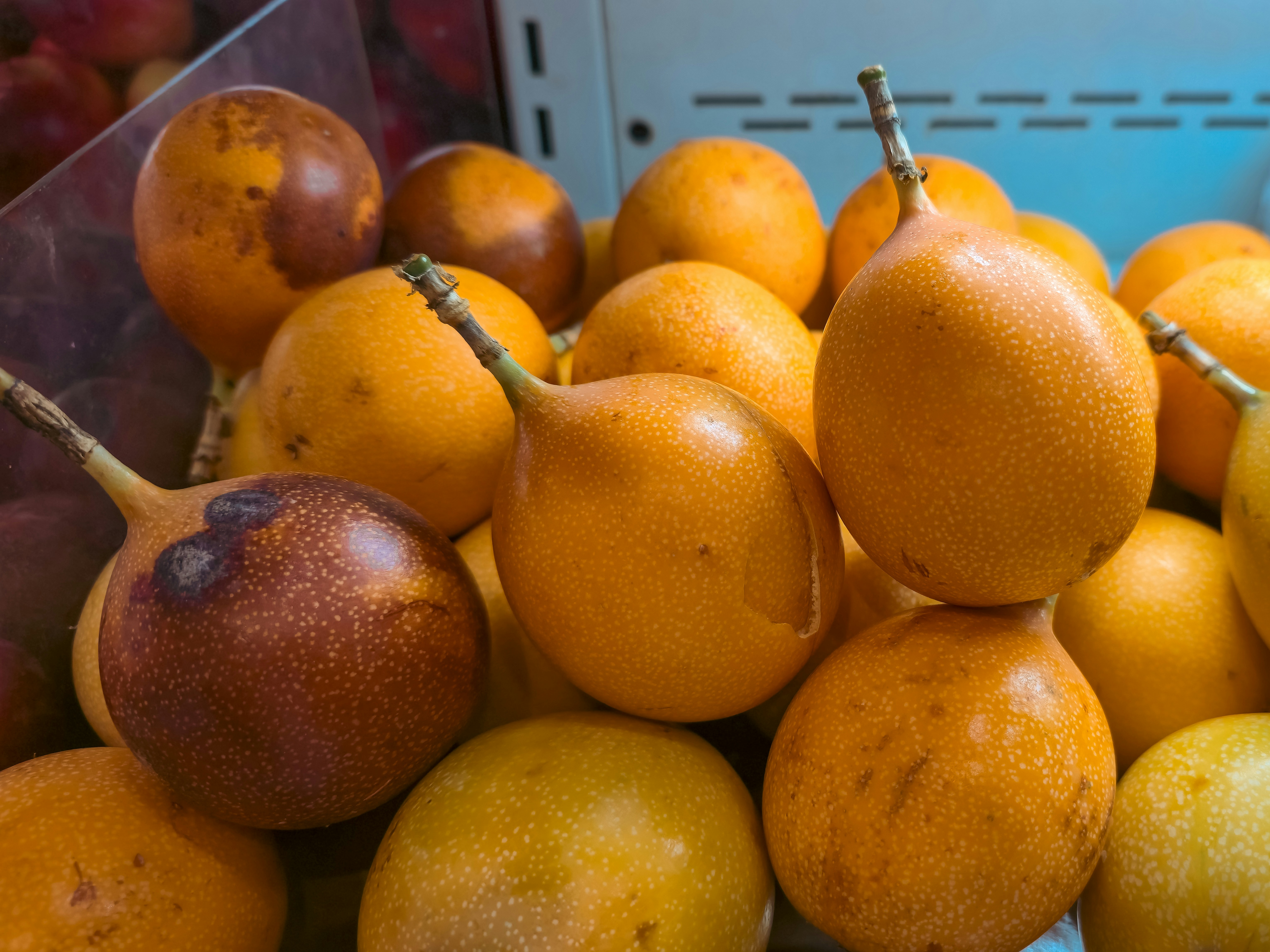 Citrus Corner: A Palette of Oranges in Market Lighting