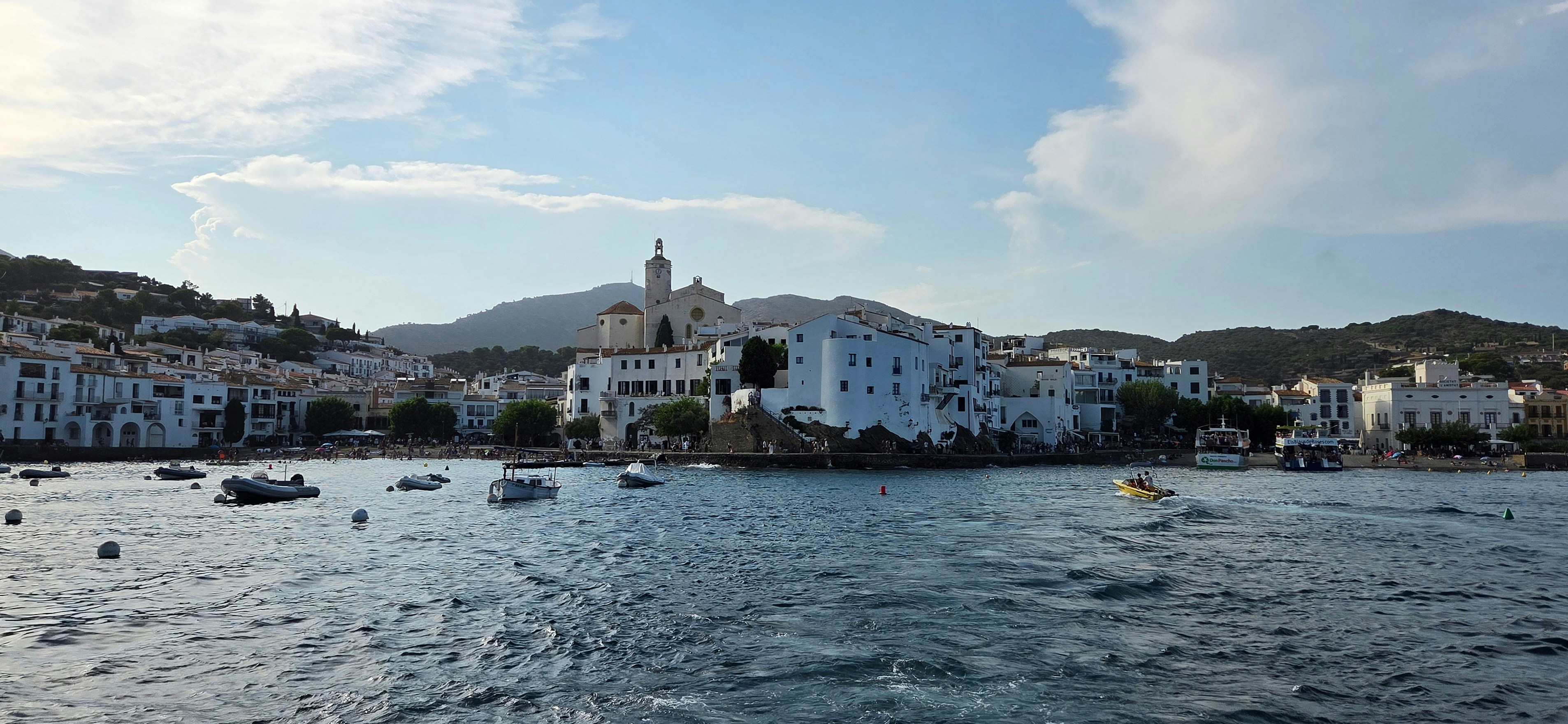 Harbor Village Dawn: Whitewashed Facades and Sea-Born Boats