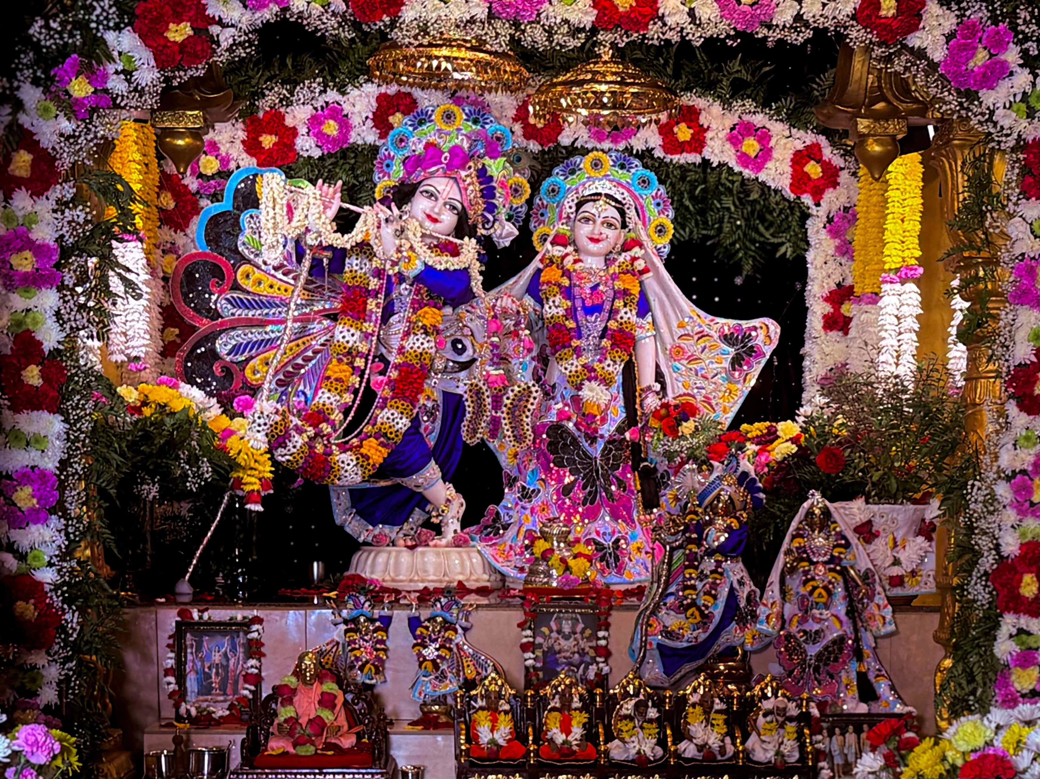 Floral Shrine of Krishna and Radha: A Colorful Festival Altar