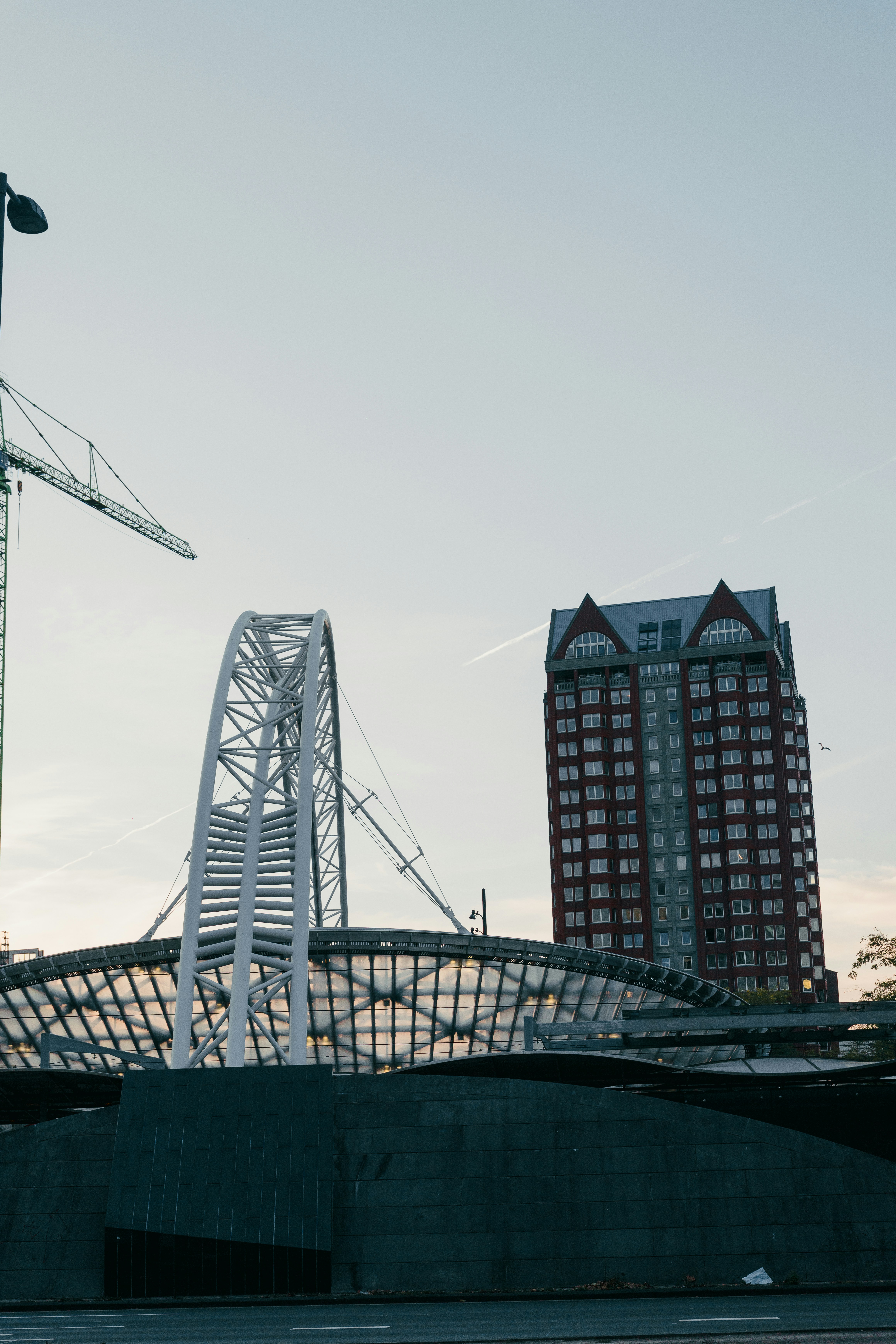 Urban Arch and Skyscraper silhouette at Dusk