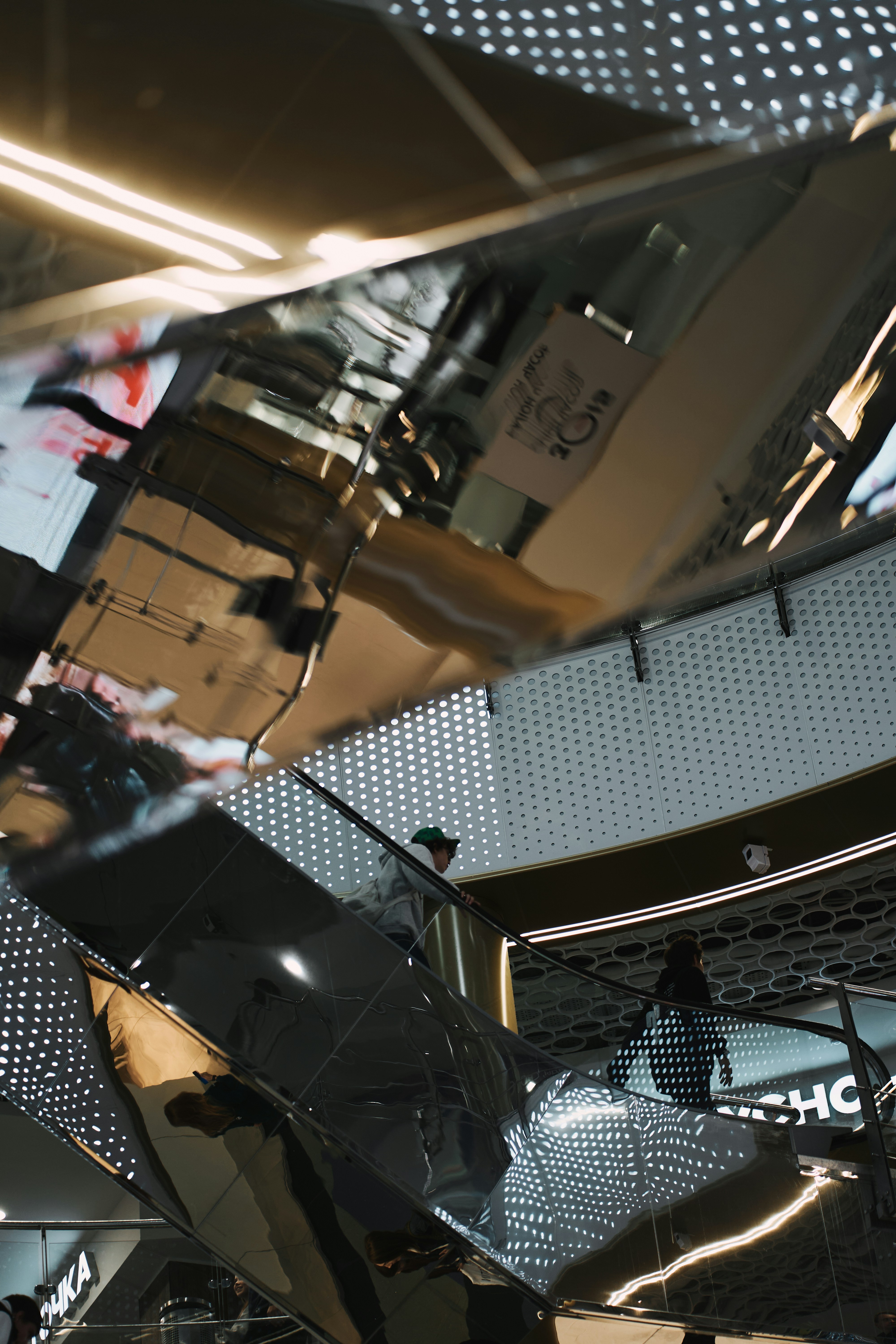 Mirrored Atrium: Abstract Reflections in a Modern Mall Stairwell