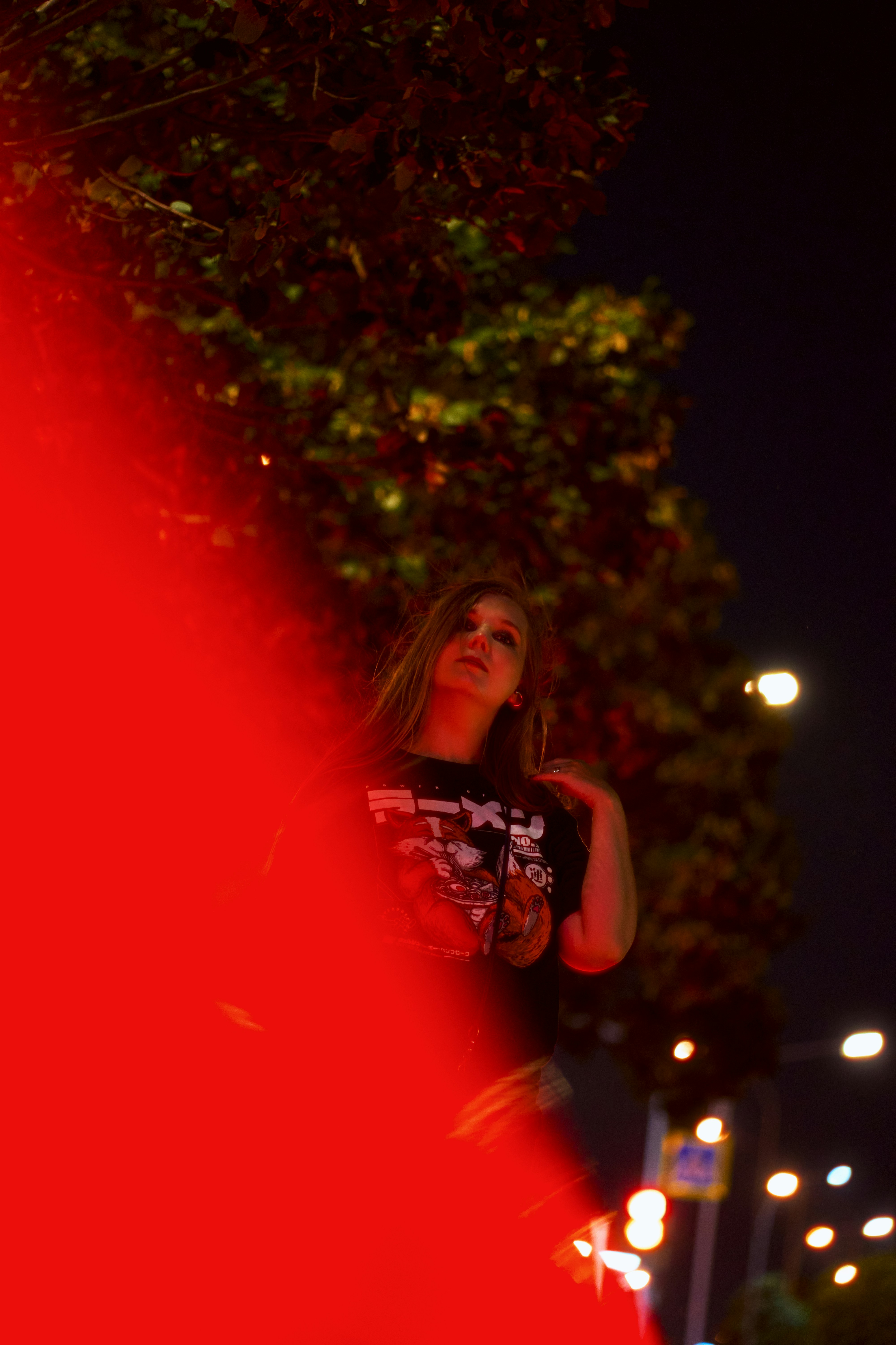 Neon Night Portrait Through a Red Veil