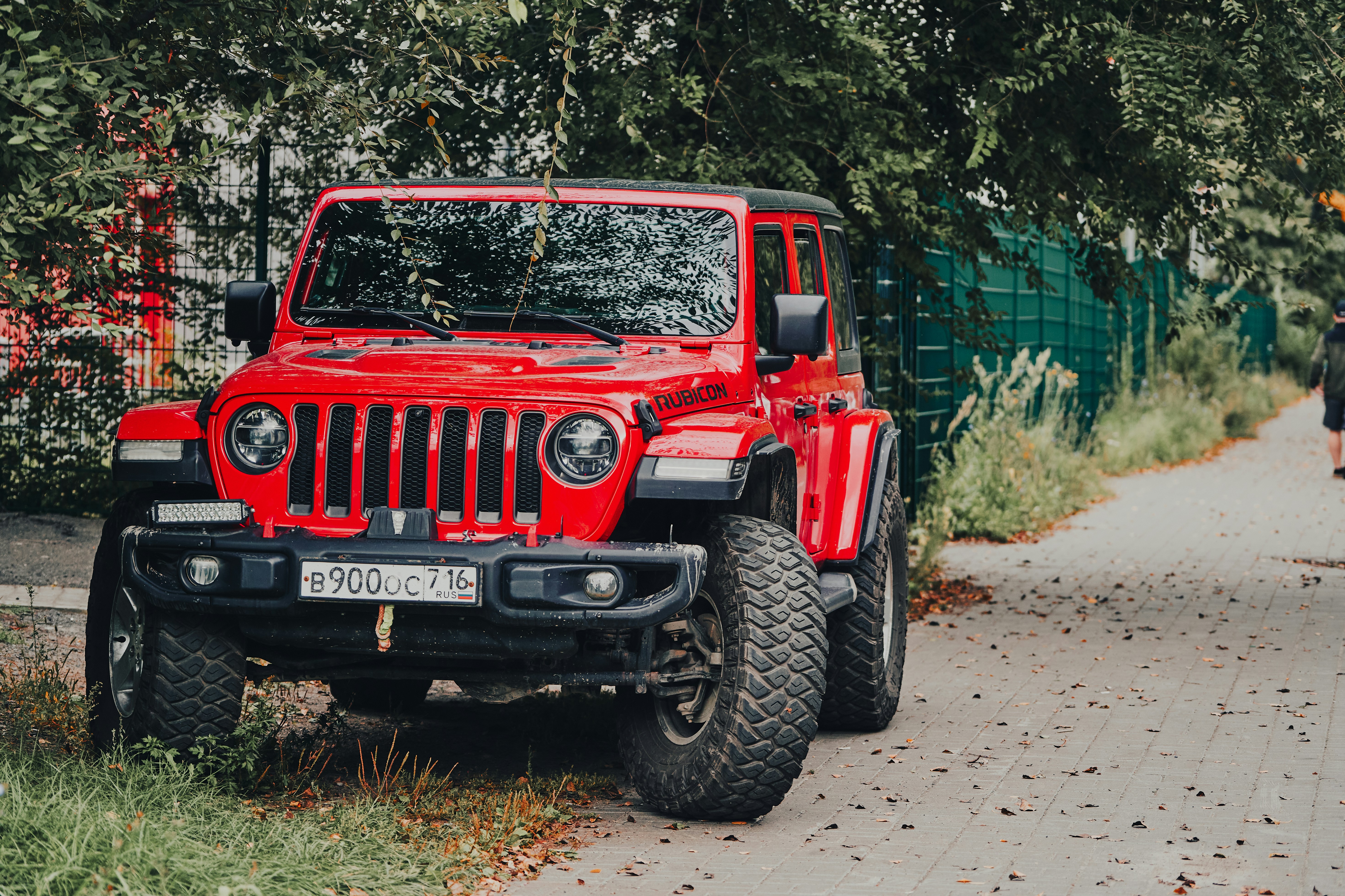 Red Jeep on a Quiet Rural Road