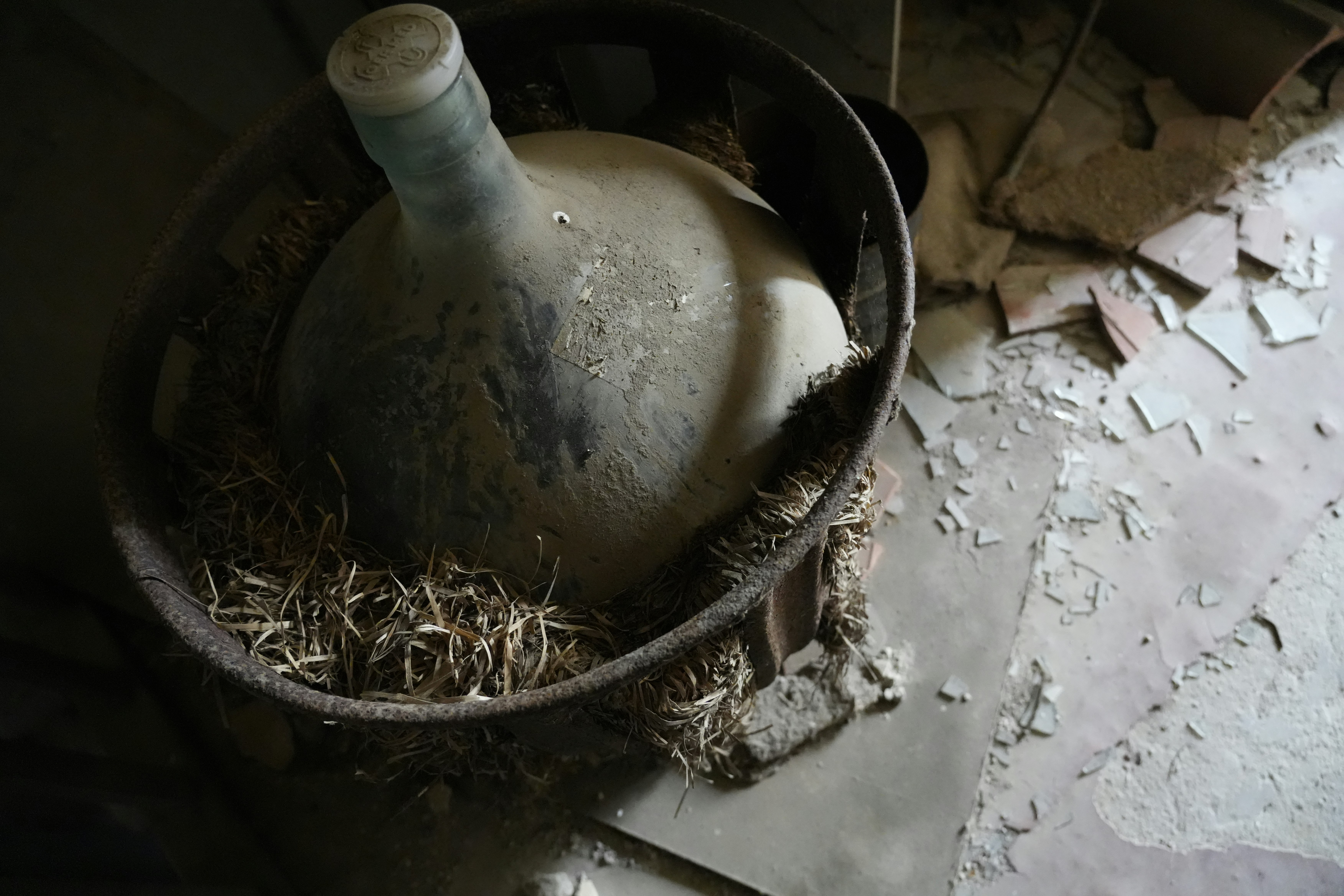 Dusty propane burner hidden in a dusty, abandoned room