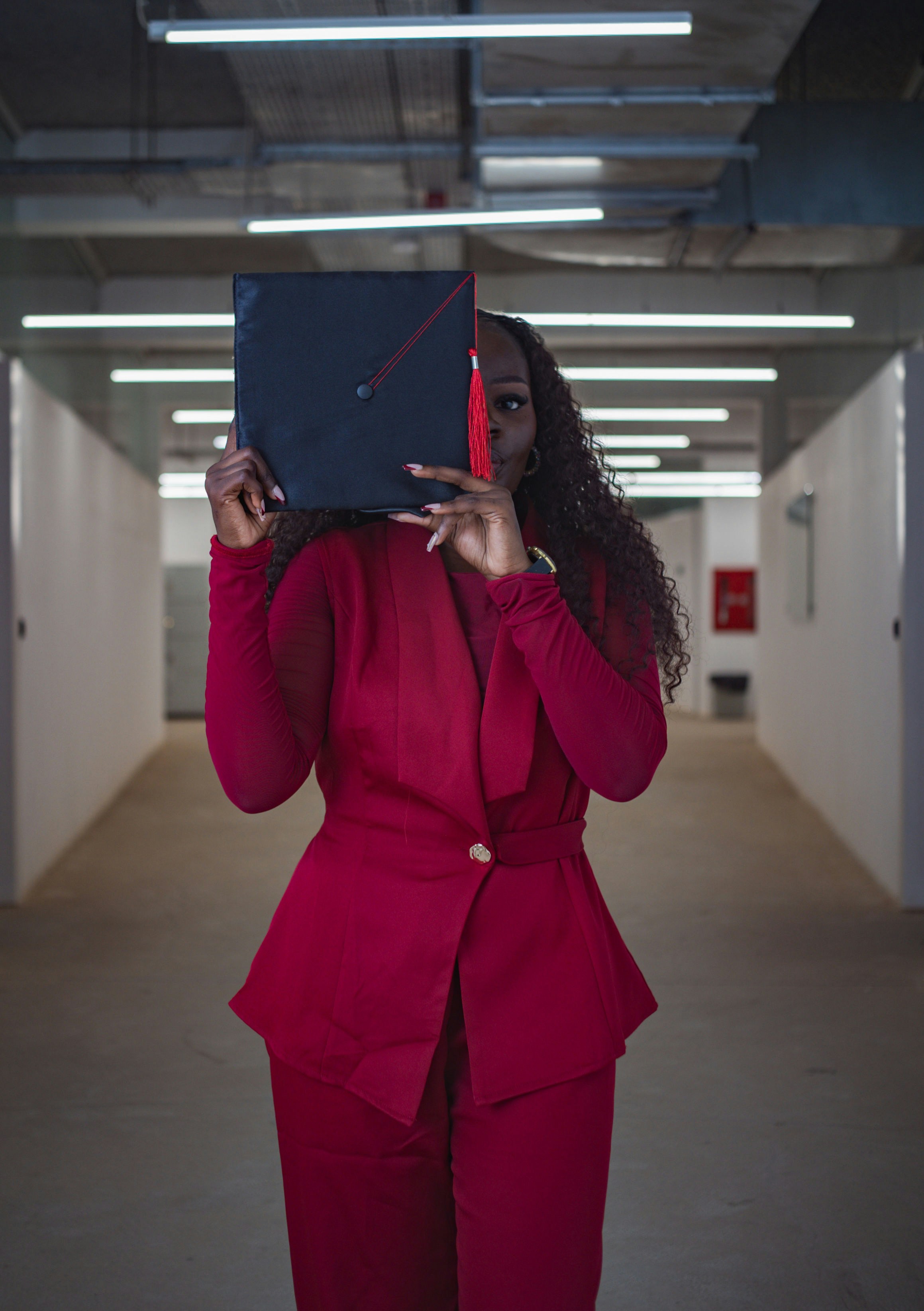 Portrait in Red: A Graduate’s Veiled Ceremony