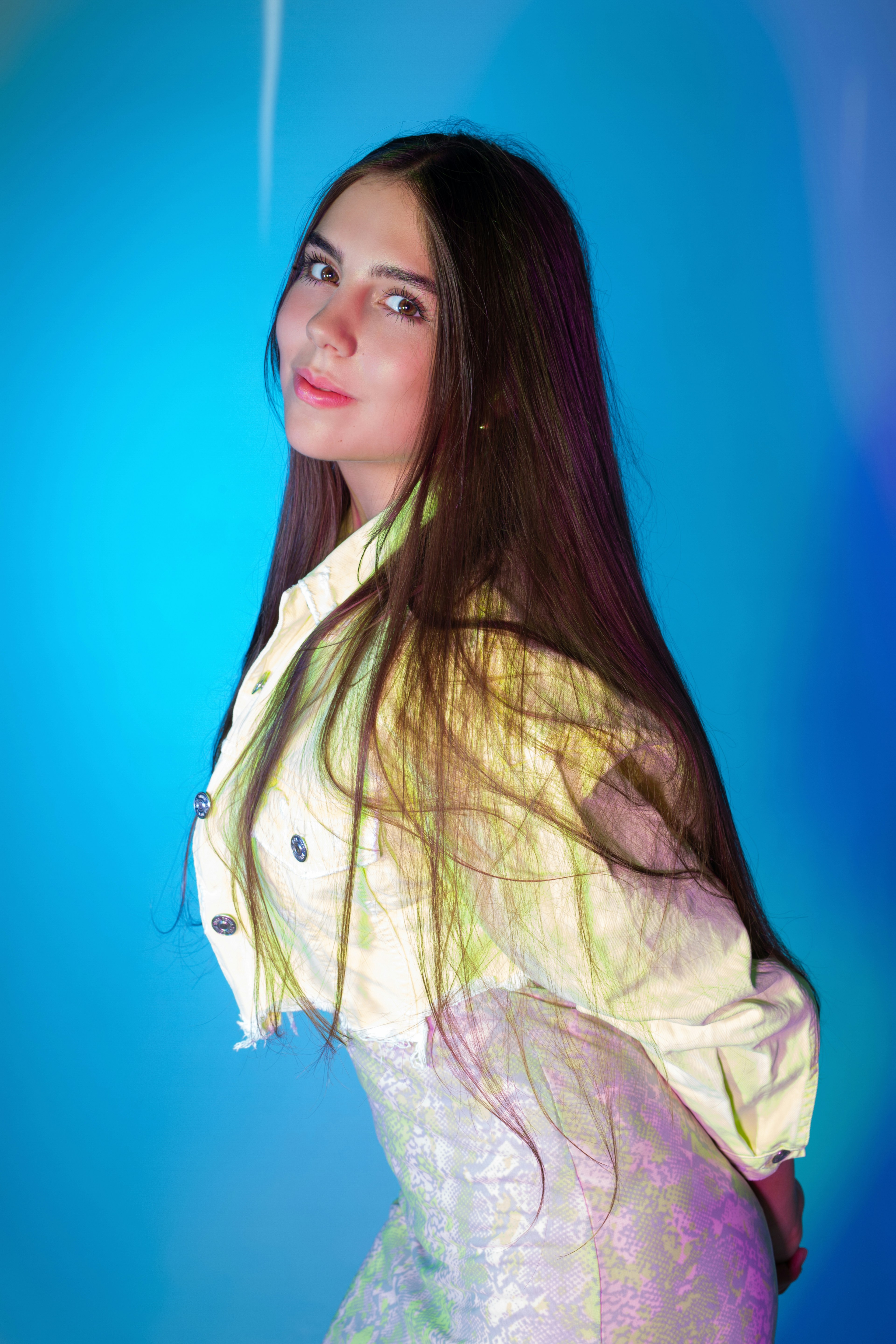 Velvet Blue Glow: A Portrait in Neon Light