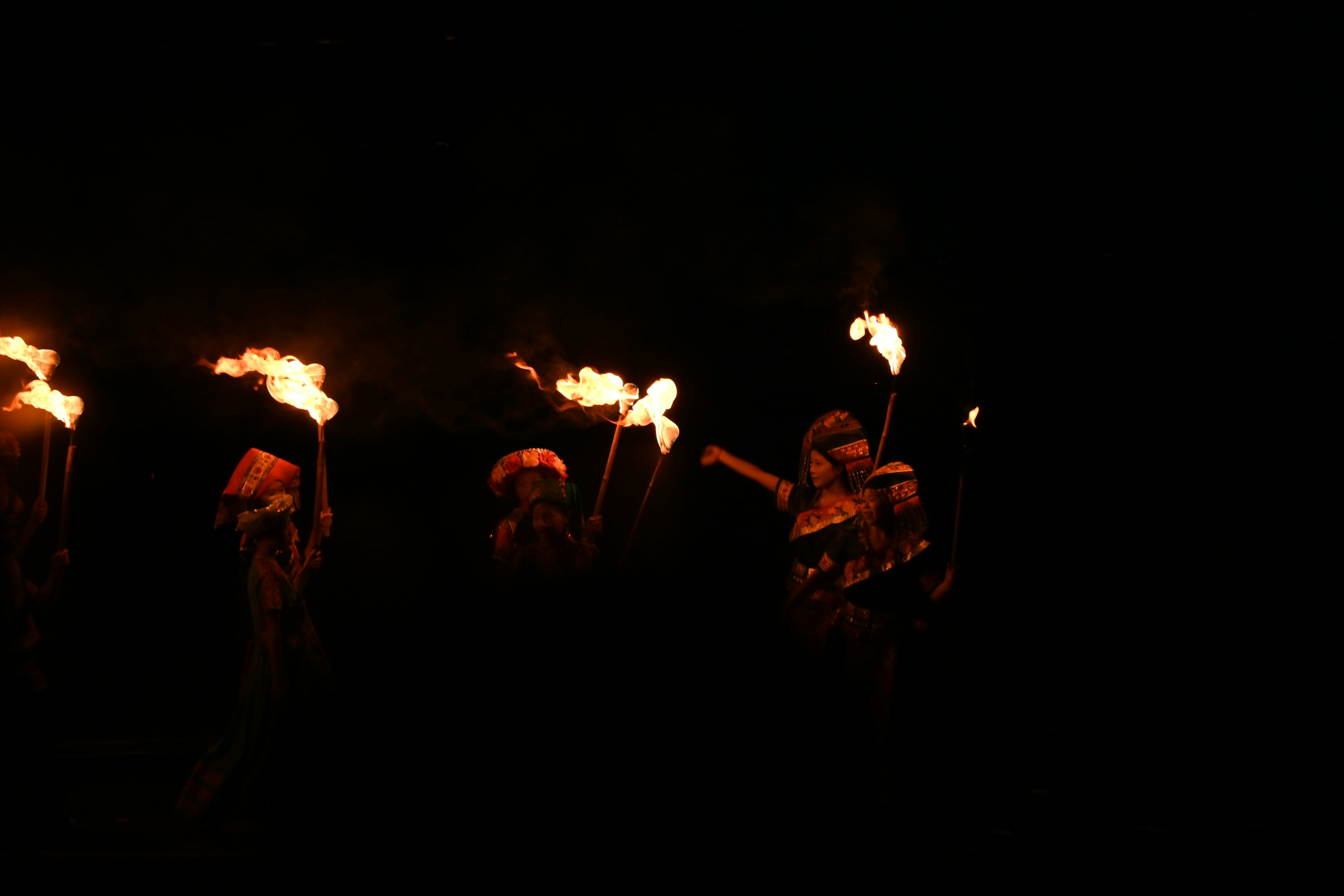 Flames of the Night: Torchbearers Cut Through Darkness