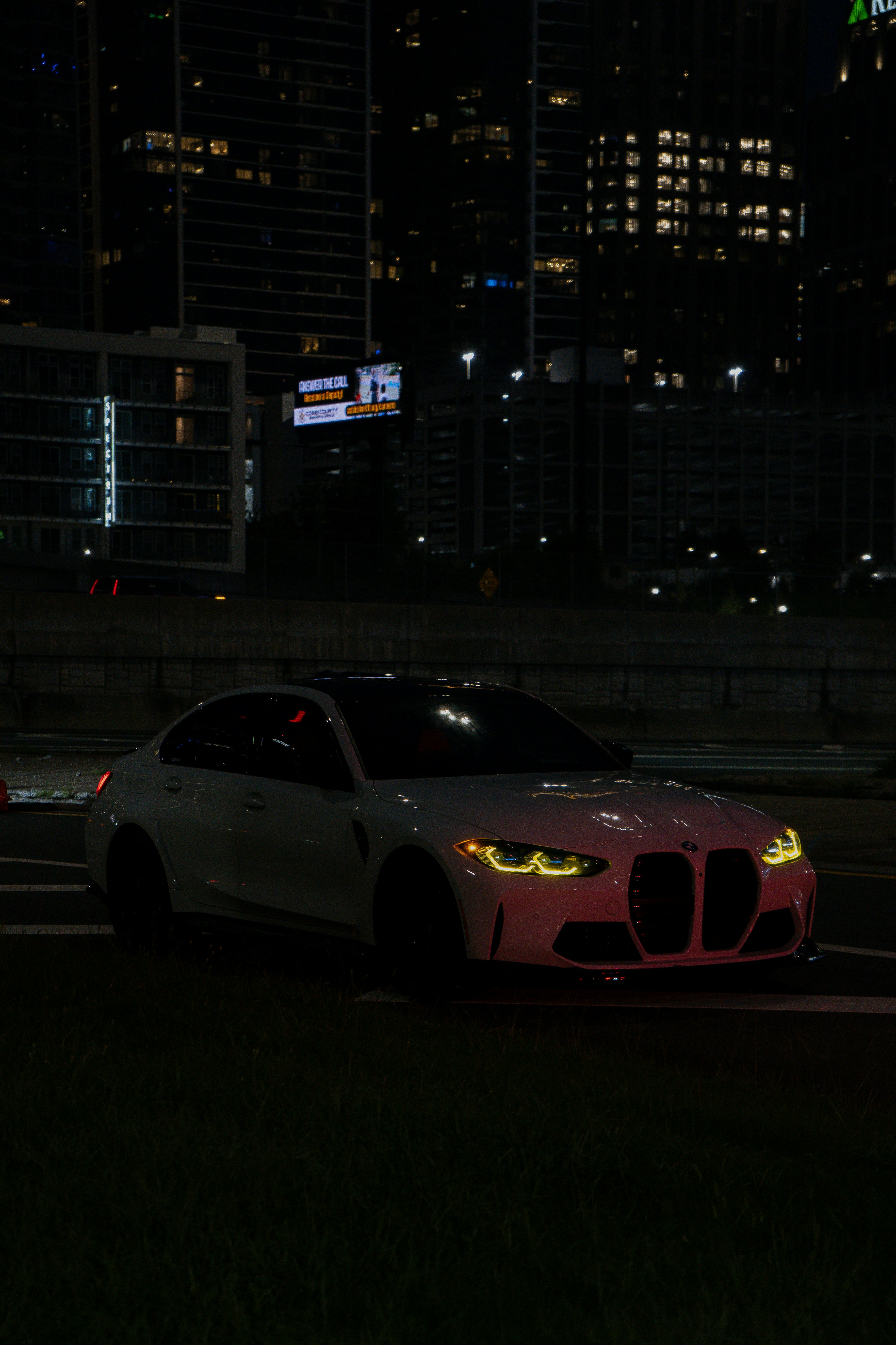 Midnight BMW on a City Edge