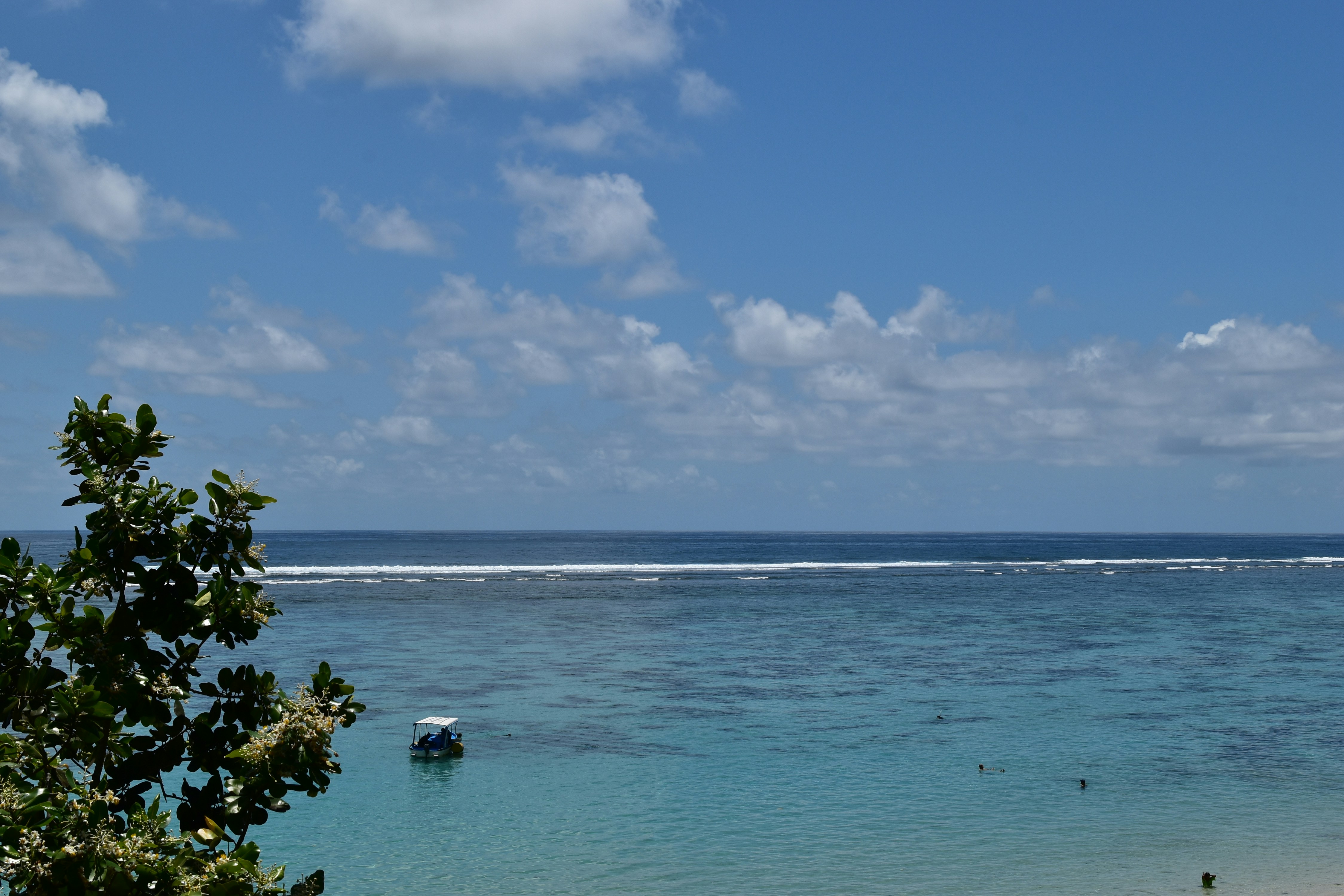 Azure Quiet: A Seaborne Horizon With Coral-Blue Waters