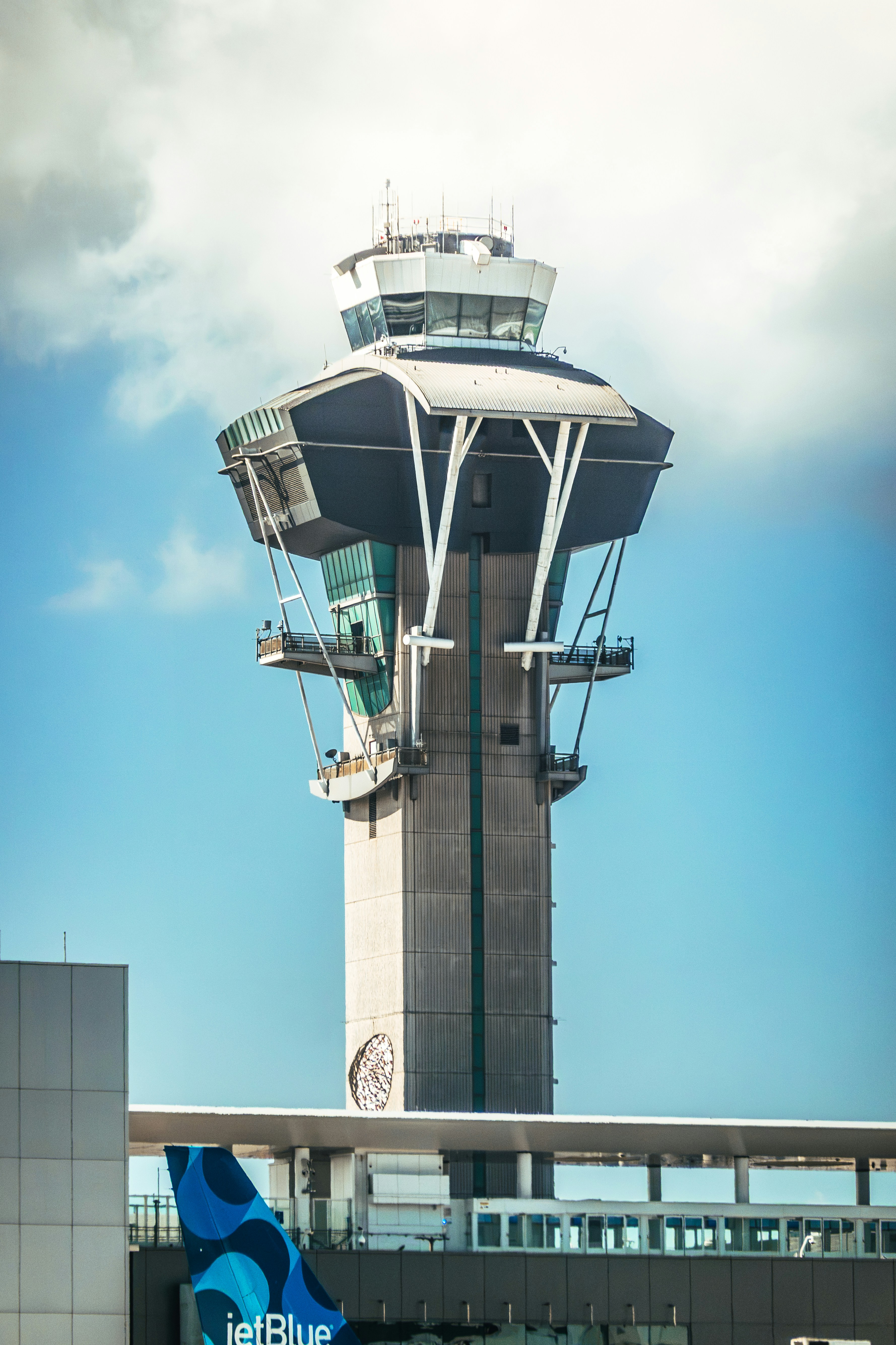 Control Tower in Focus: Sky, Structure, and JetBlue Branding