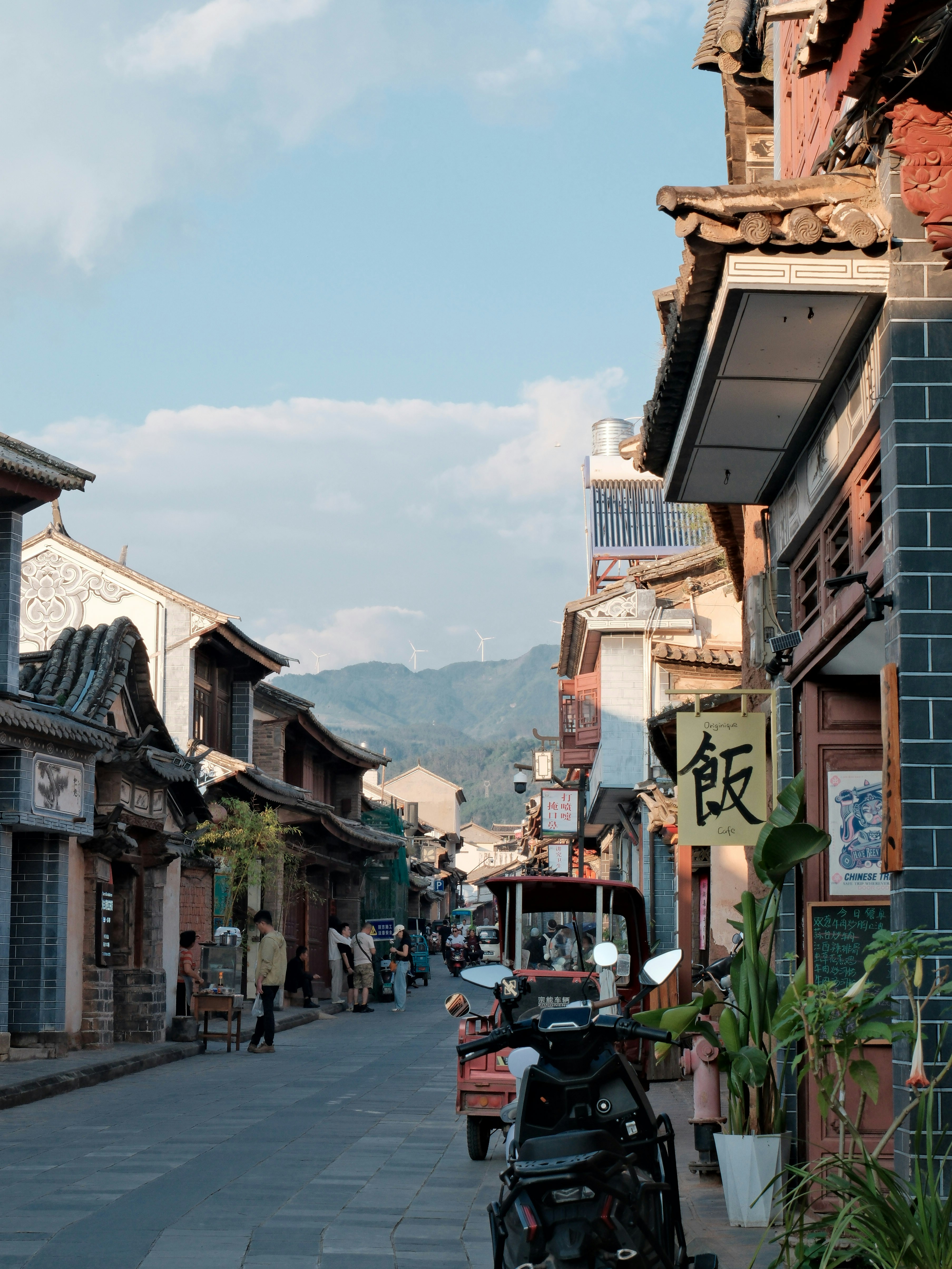 Lanterns, Motorbikes, and Mountain Mists: A Quiet Street Through Time