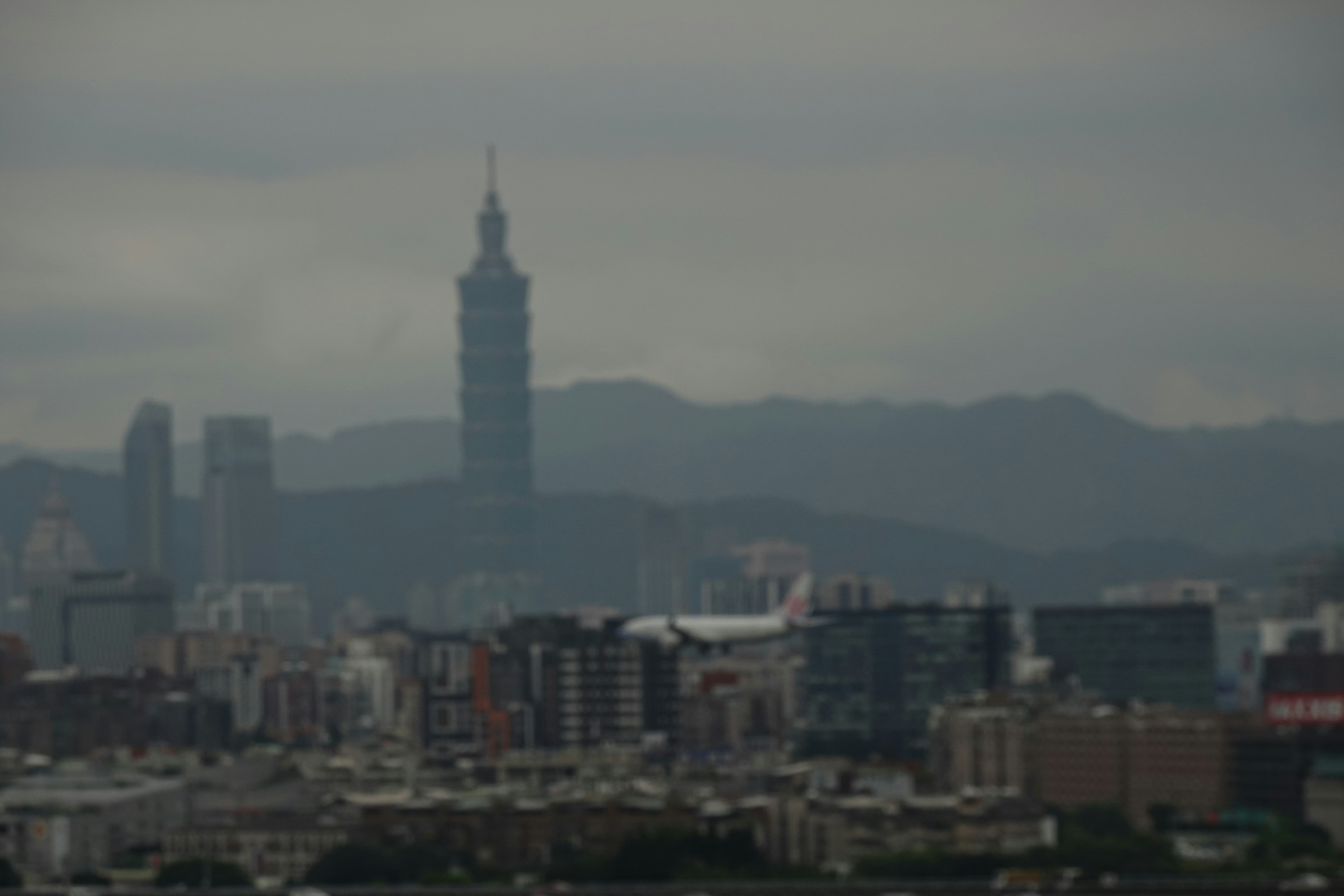 City Skyline Under Overcast Morning Mist