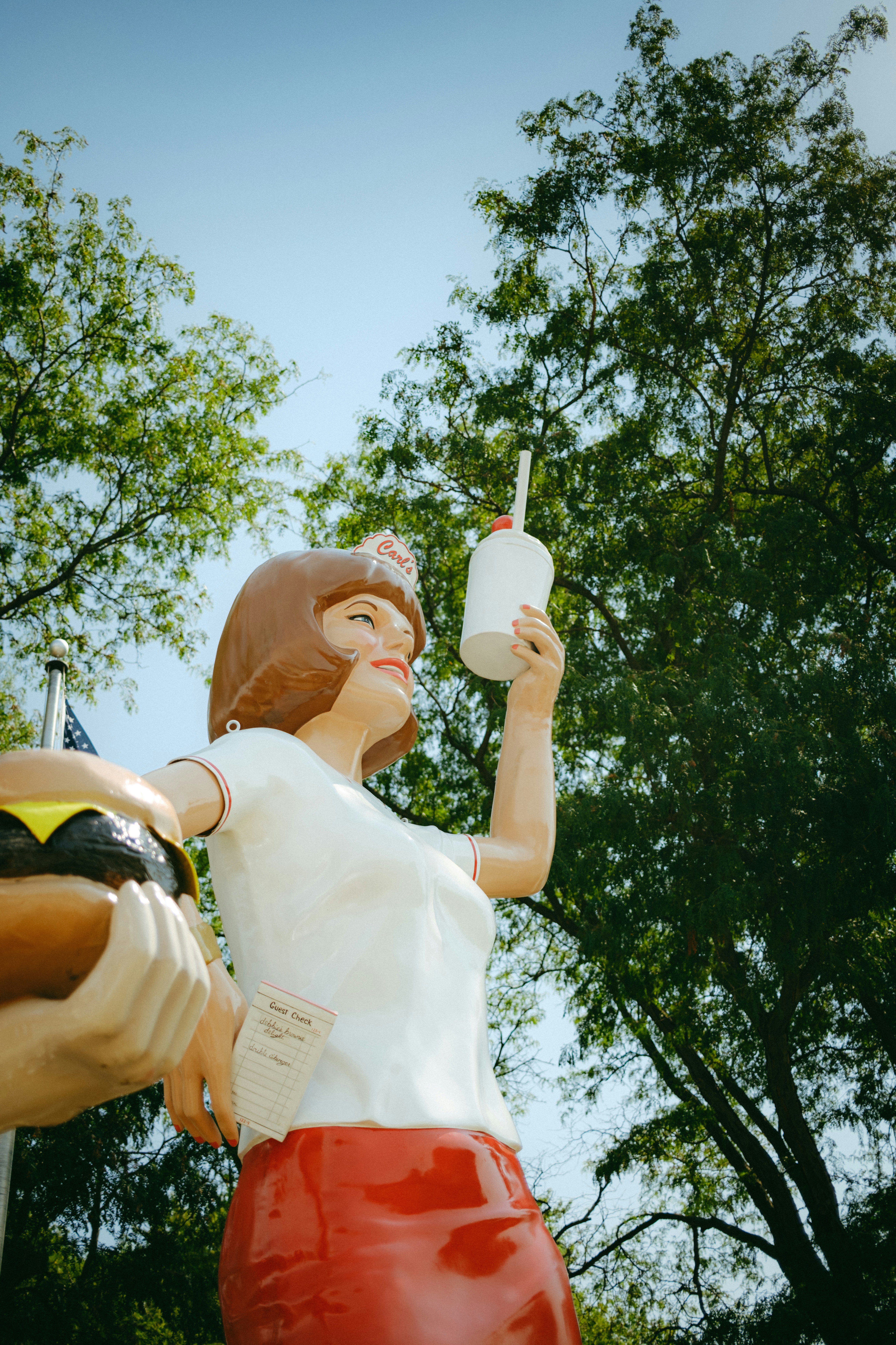 Giant Soda-Slinging Statue Towers Over Park Visitors