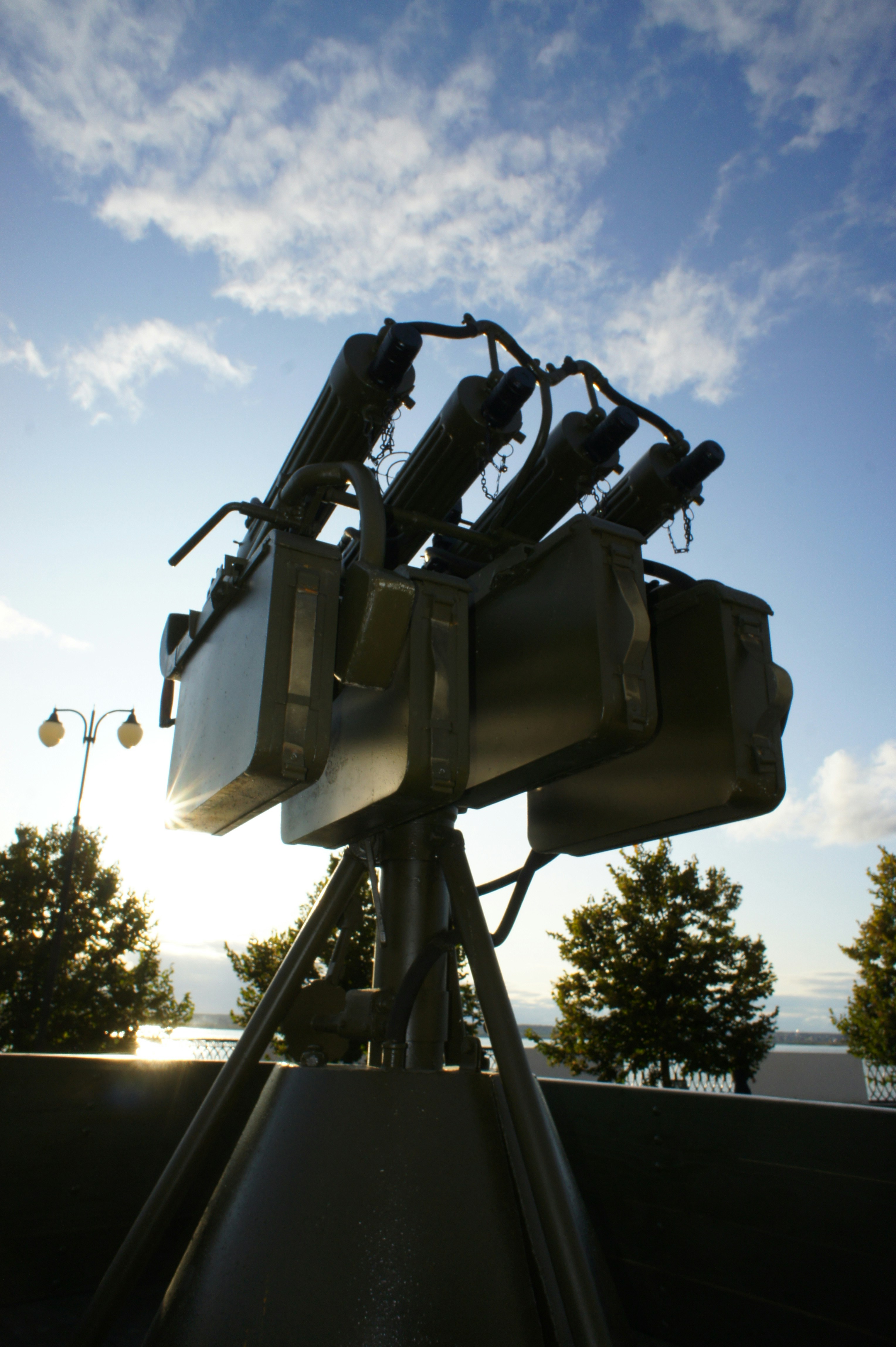 Industrial Spotlight: A Row of Canister Lamps Reaching Toward the Sky