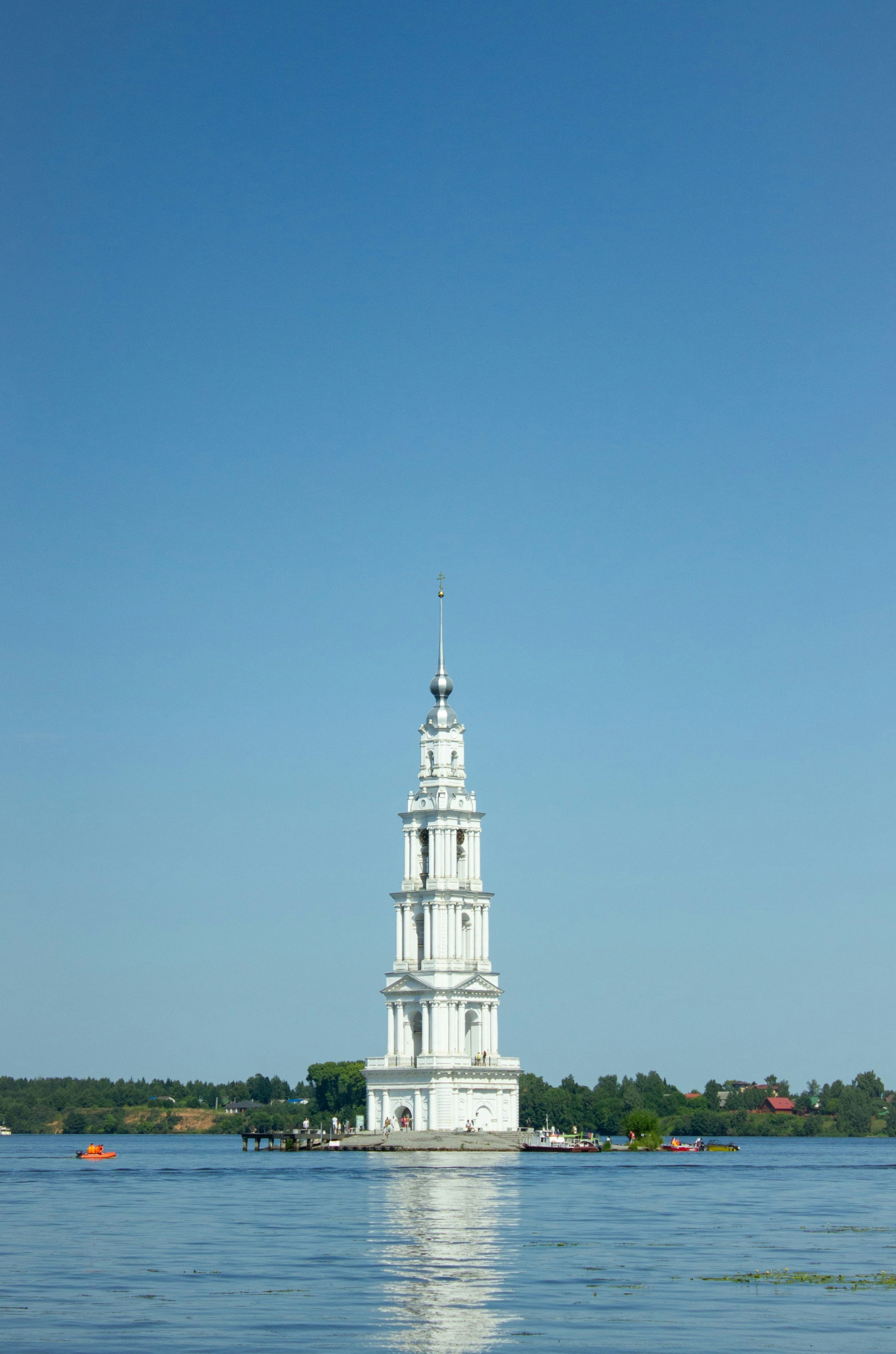 White Pagoda Rising from the Quiet Lake
