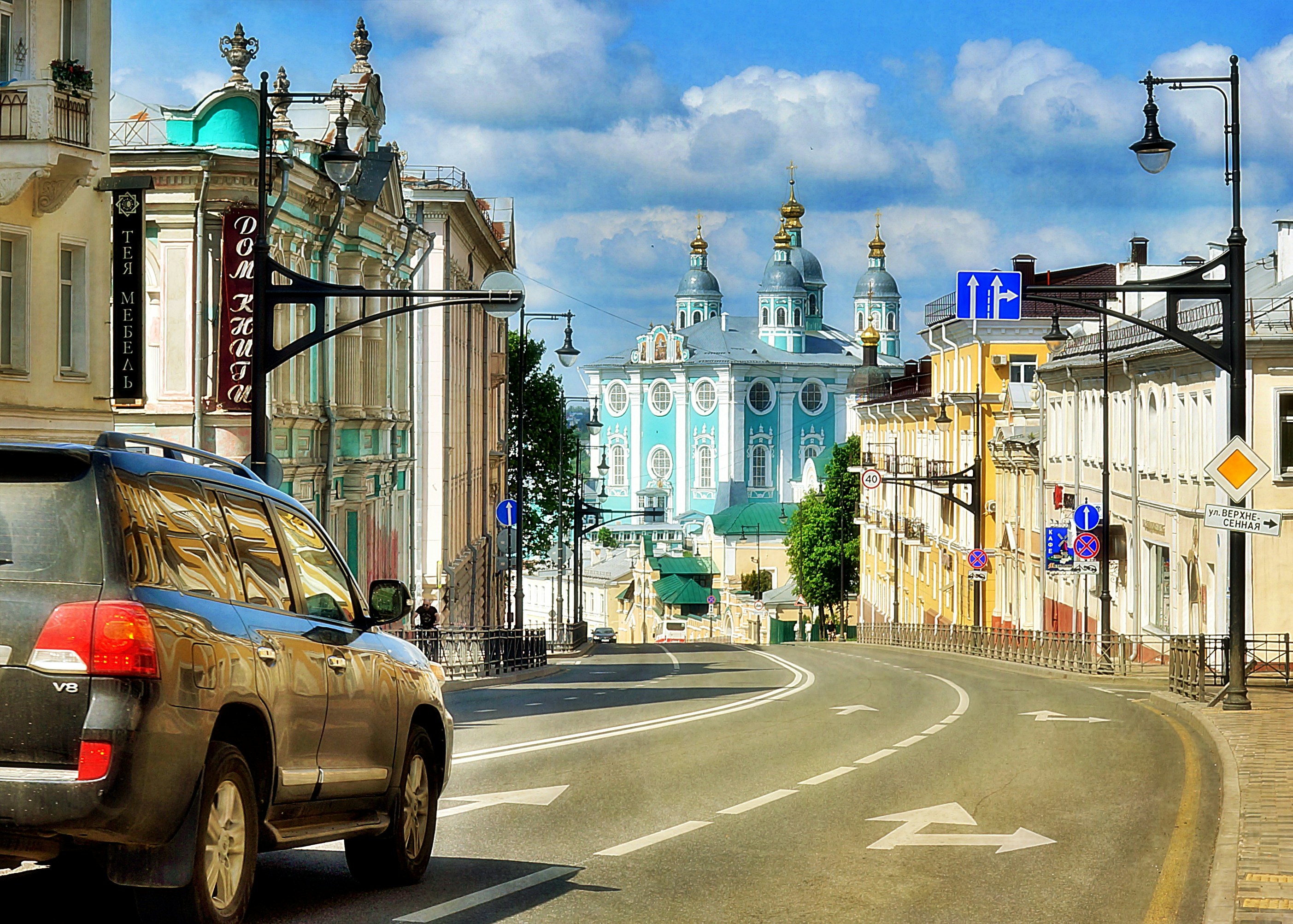 Blue Onion Spires: A Central Cathedral Framed by a Quiet City Street