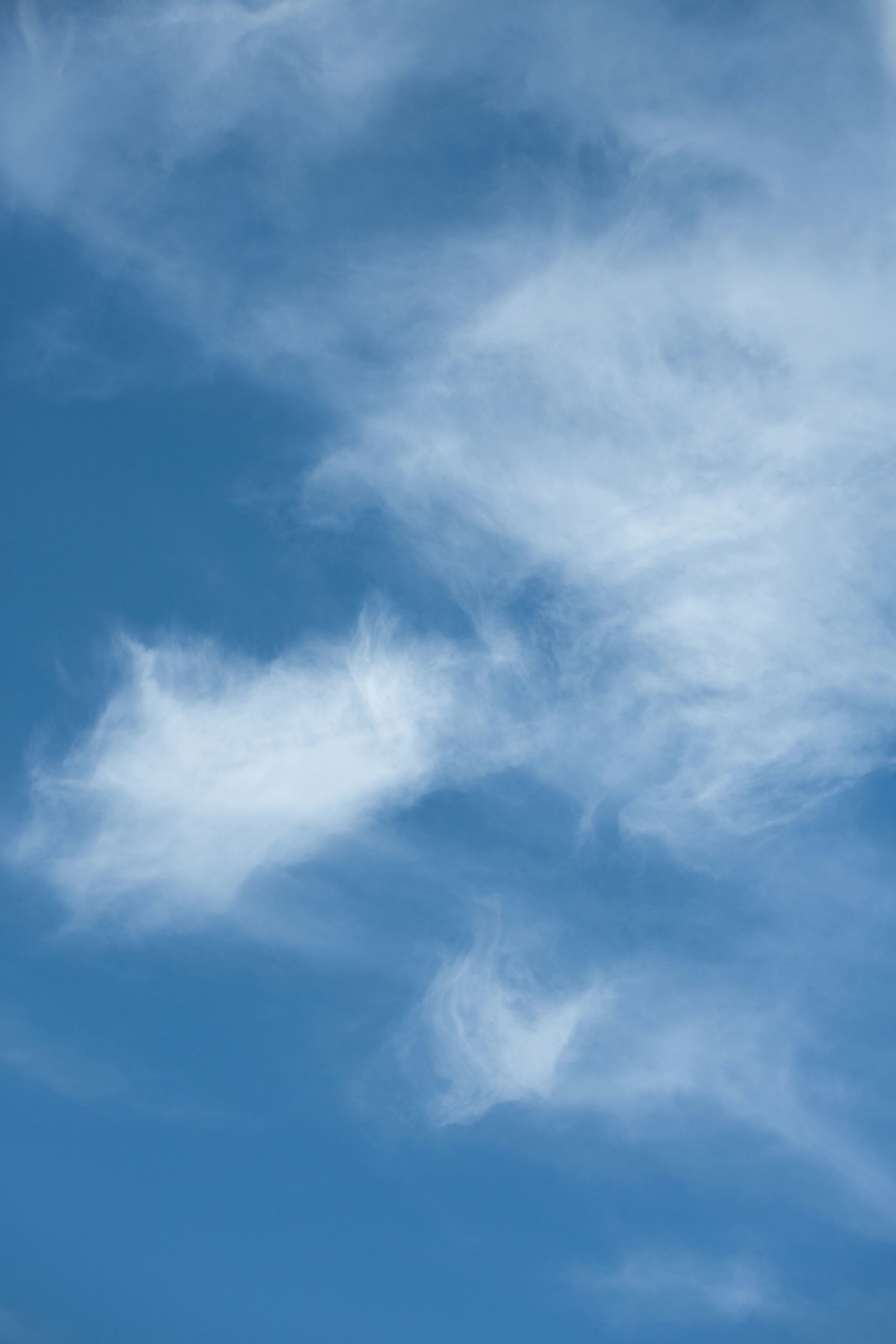 Midday Skyrift: A Clean Slice of Blue with Wisps
